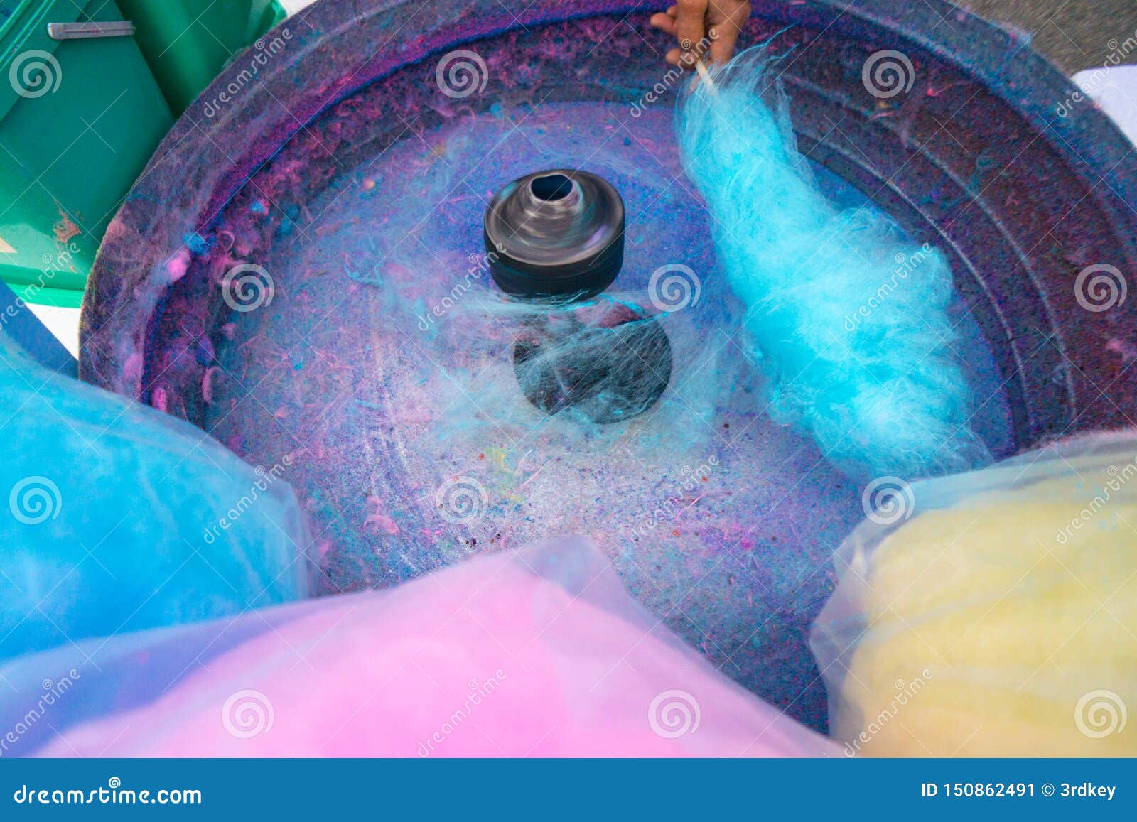 Hand Rolling Cotton Candy In Candy Floss Machine. Candyfloss Making ...