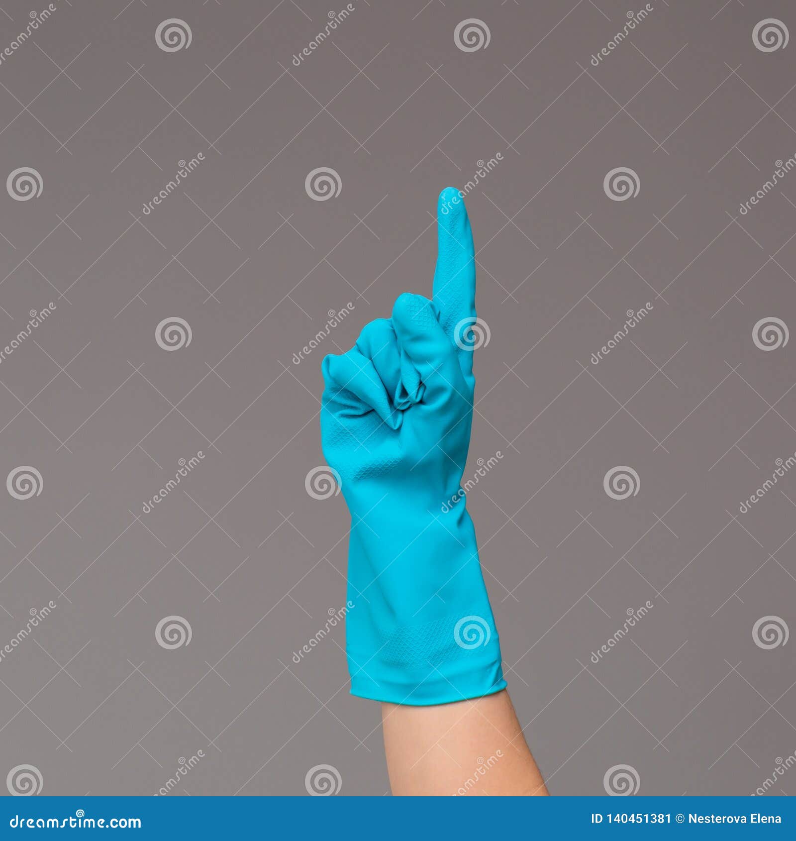Hand in Rubber Glove Points Upwards with Index Finger. Neutral ...