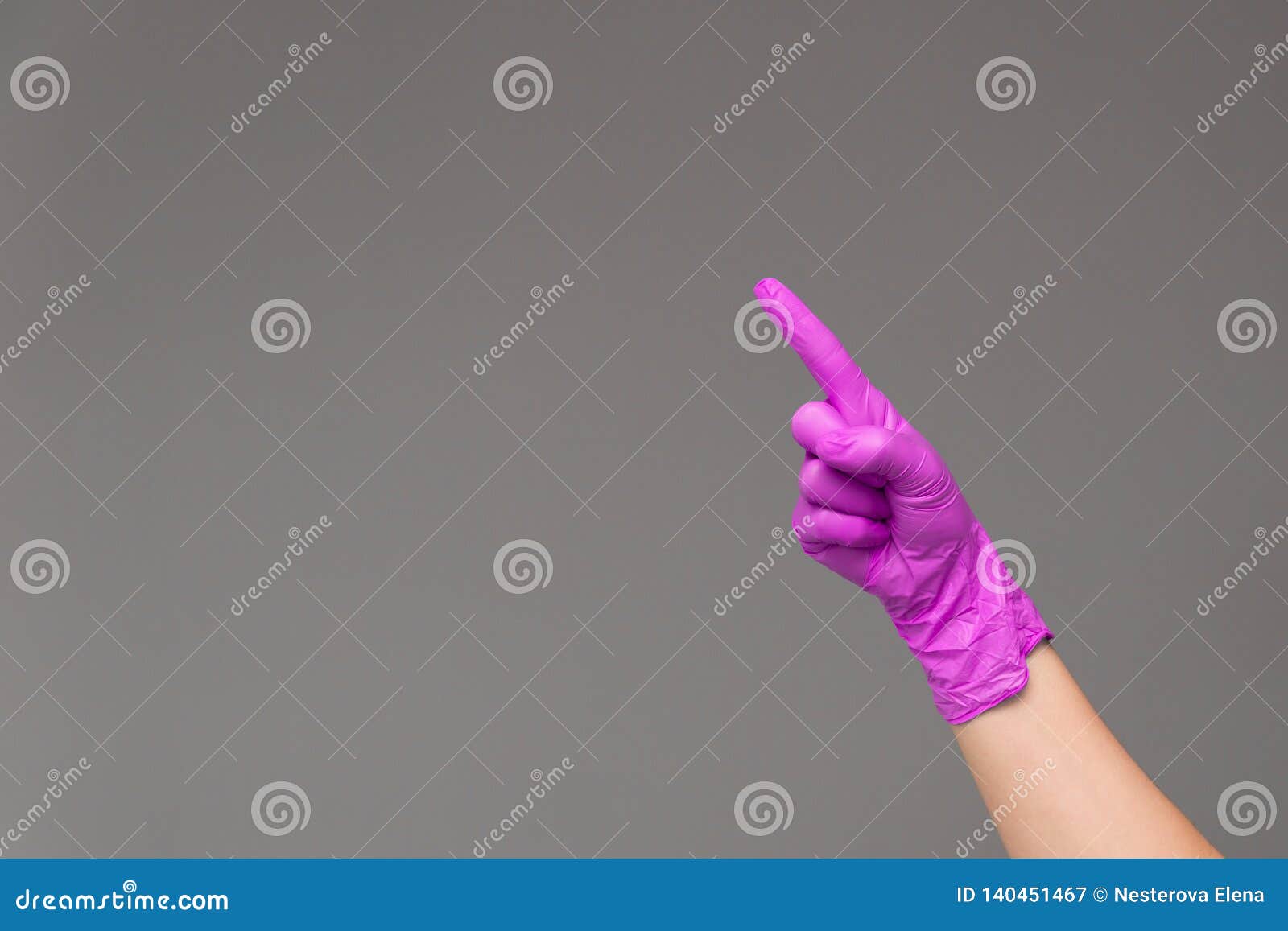 Hand in Rubber Glove Points Upwards with Index Finger. Neutral ...