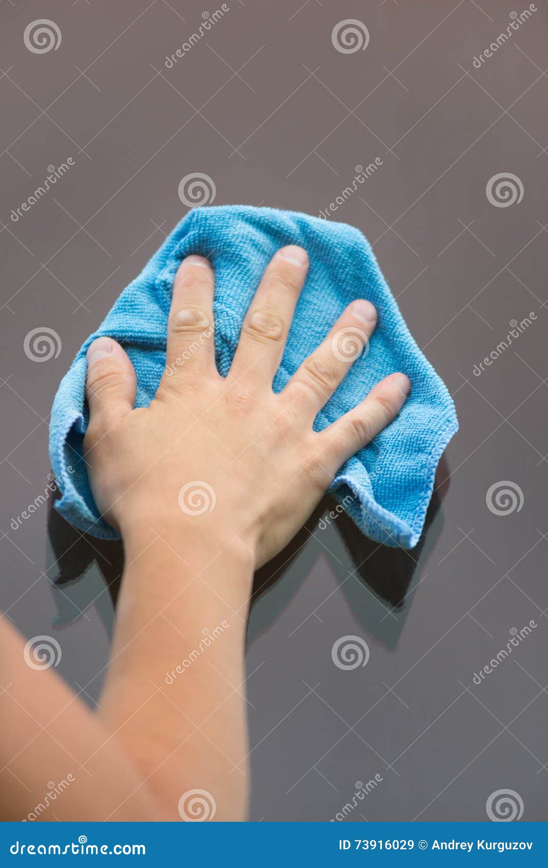 Hand Rubs Glass, Blue Cloth Stock Image - Image of hand, cleaning: 73916029