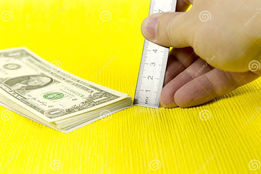 A Bundle of Dollars and a Ruler. Stock Image - Image of analysis ...
