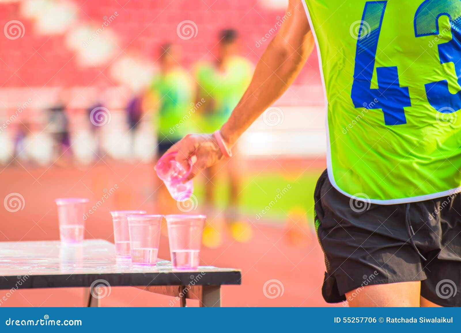 The Hand of the Runner Grabbing the Water Stock Photo - Image of ...
