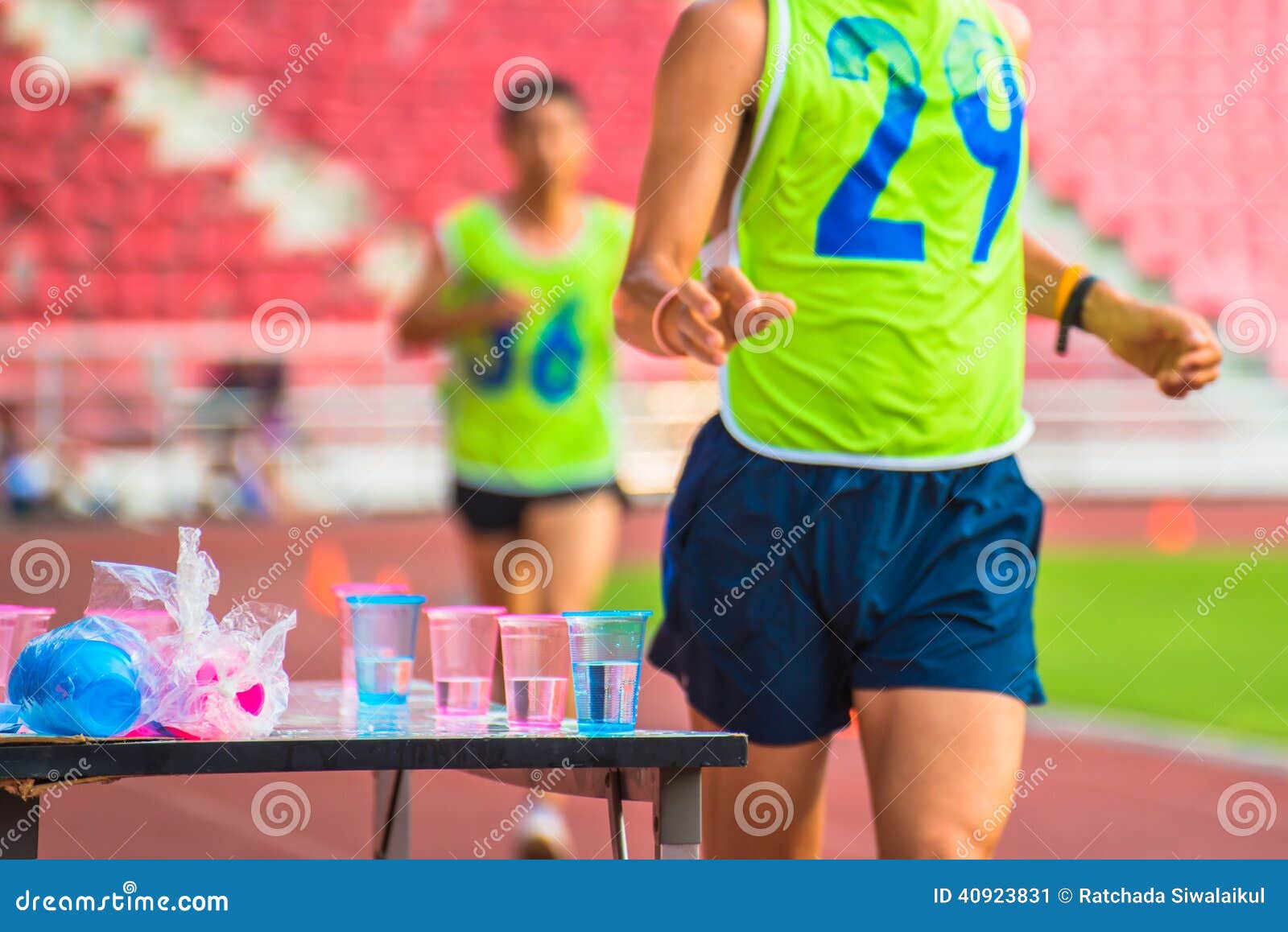 The Hand of the Runner Grabbing the Water Stock Image - Image of ...