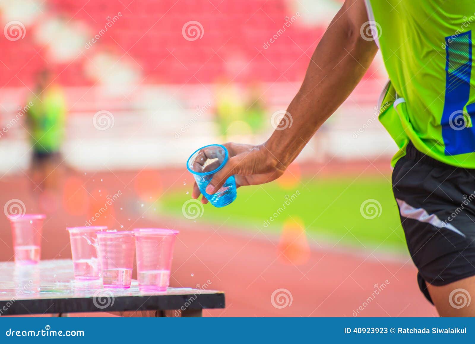 The Hand of the Runner Grabbing the Water Stock Image - Image of lonely ...