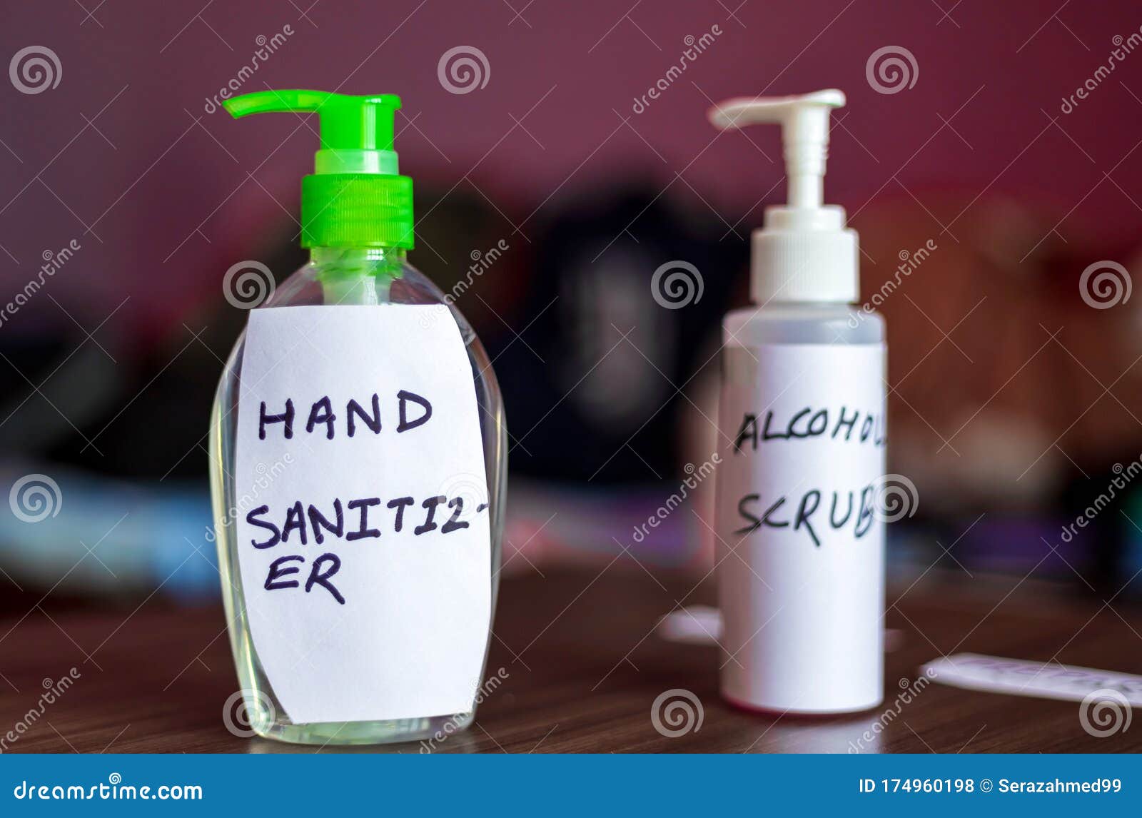 Hand Sanitizer and Alcohol Scrub Placed Next To Each Other Stock Photo ...
