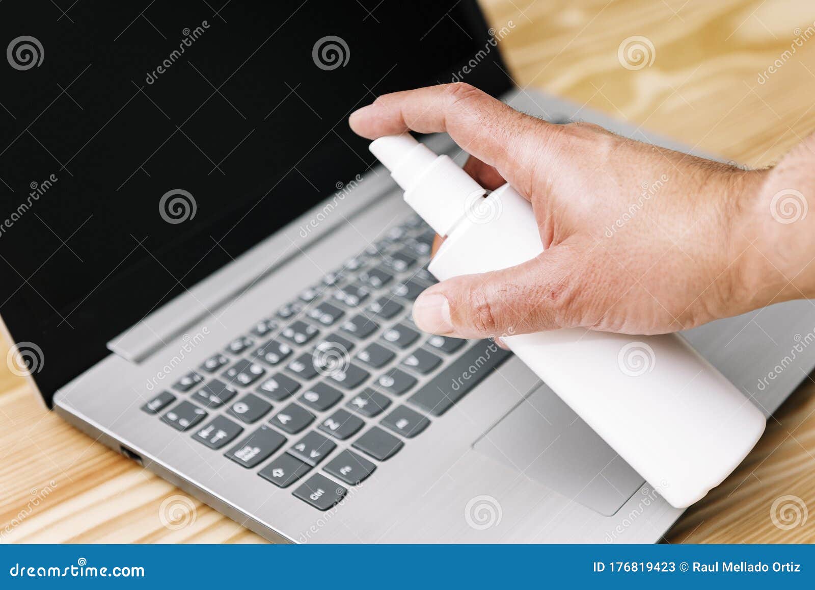 Hand Sanitizing Computer with Antibacterial Spray Stock Image - Image ...