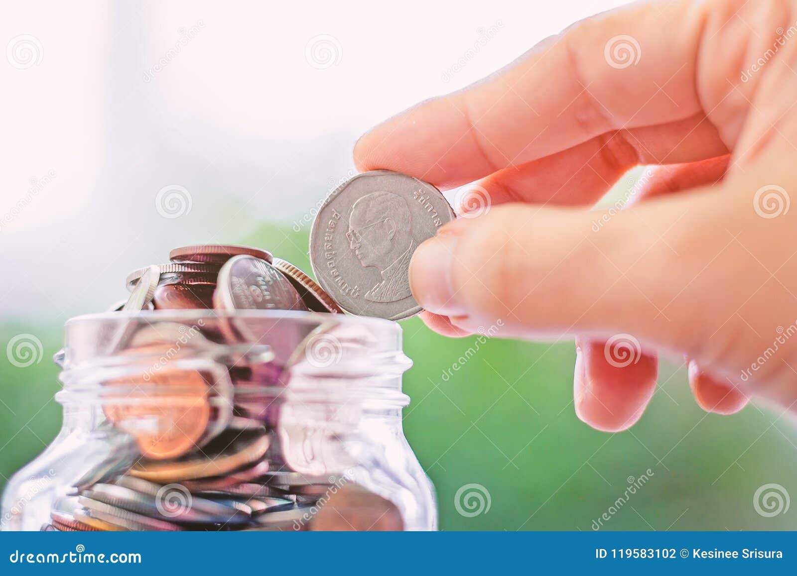 Hand Saving a Coin into the Glass Jar Stock Photo - Image of coin ... Hand Saving a Coin into the Glass Jar Stock Photo - Image of coin ...