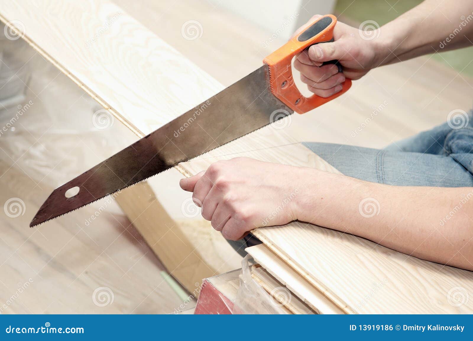 Hand saw cutting a board stock photo. Image of cabinetmaker - 13919186