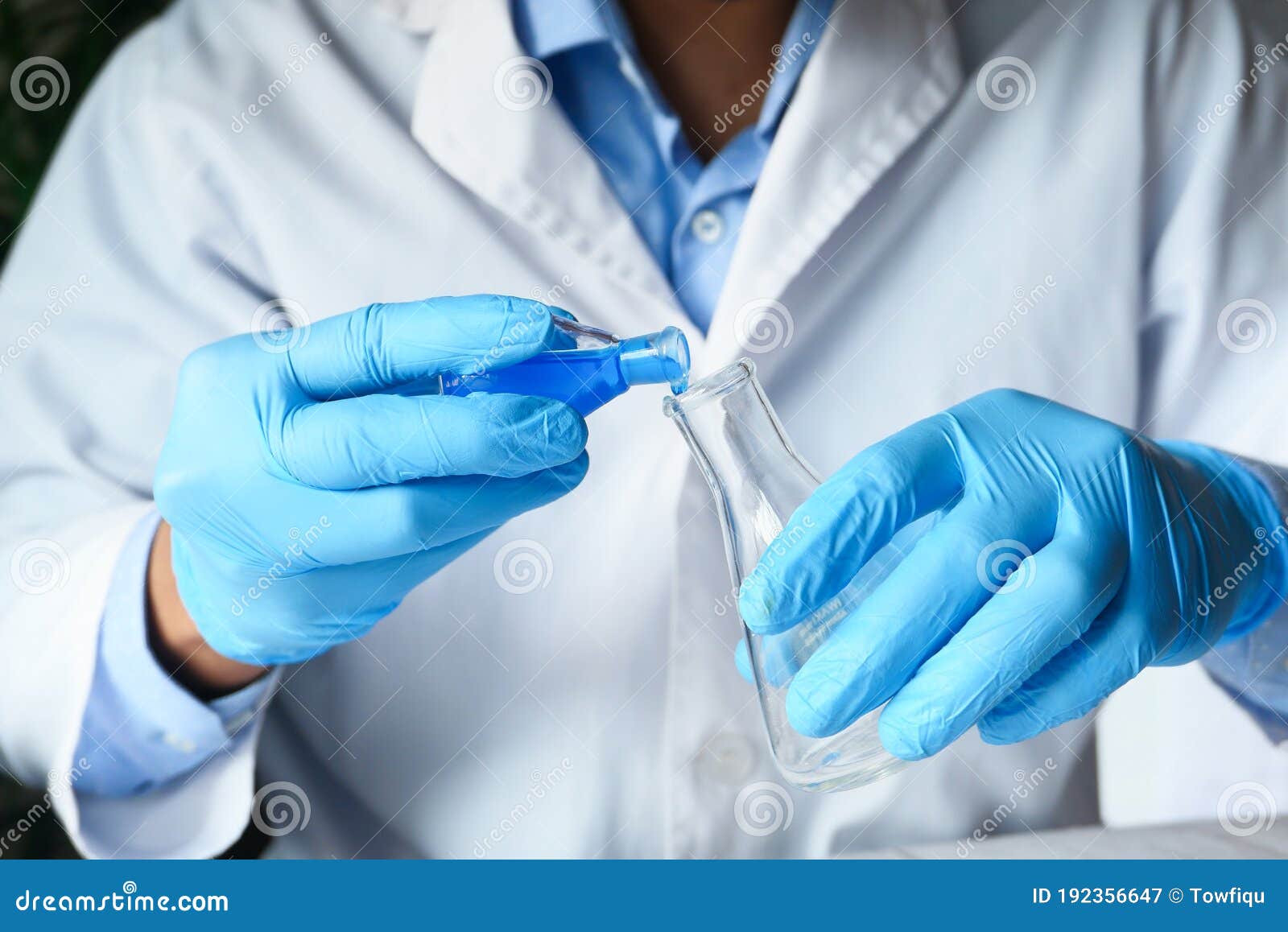 Hand of Scientist Holding Lab Glassware Top Down. Stock Image - Image ...