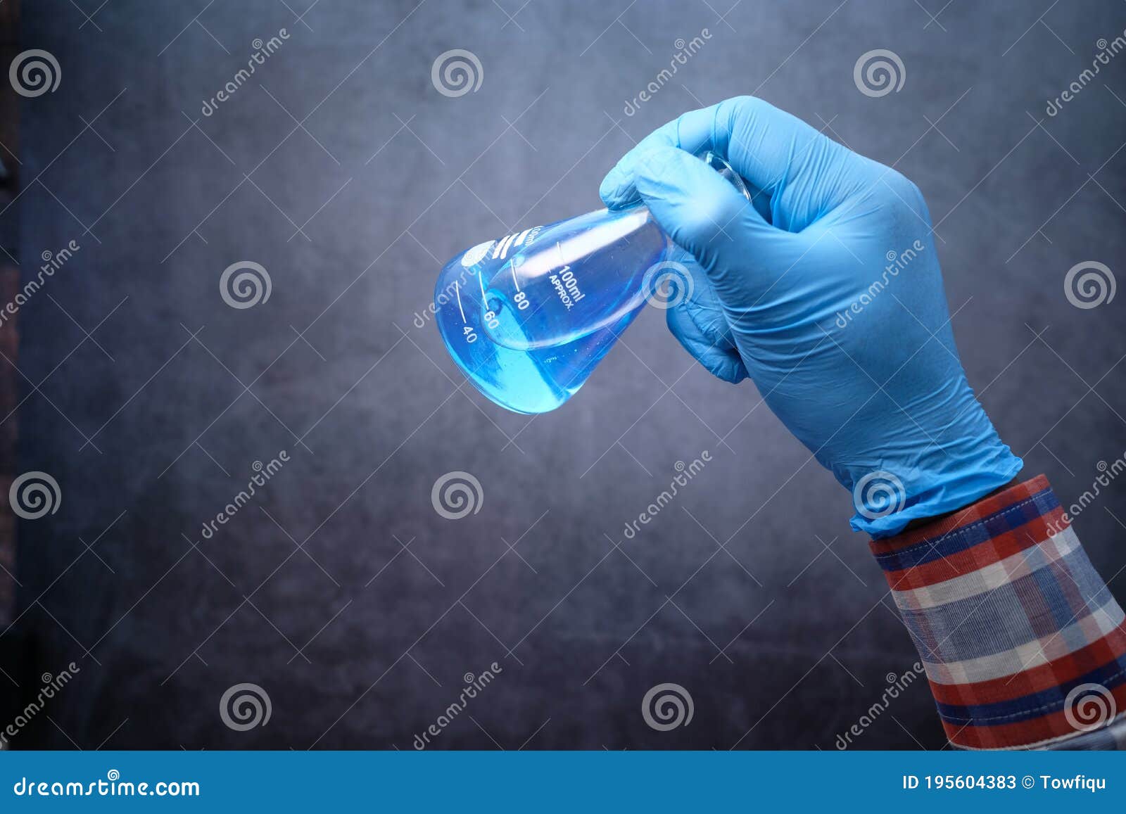 Hand of Scientist Holding Lab Glassware Top Down. Stock Image - Image ...
