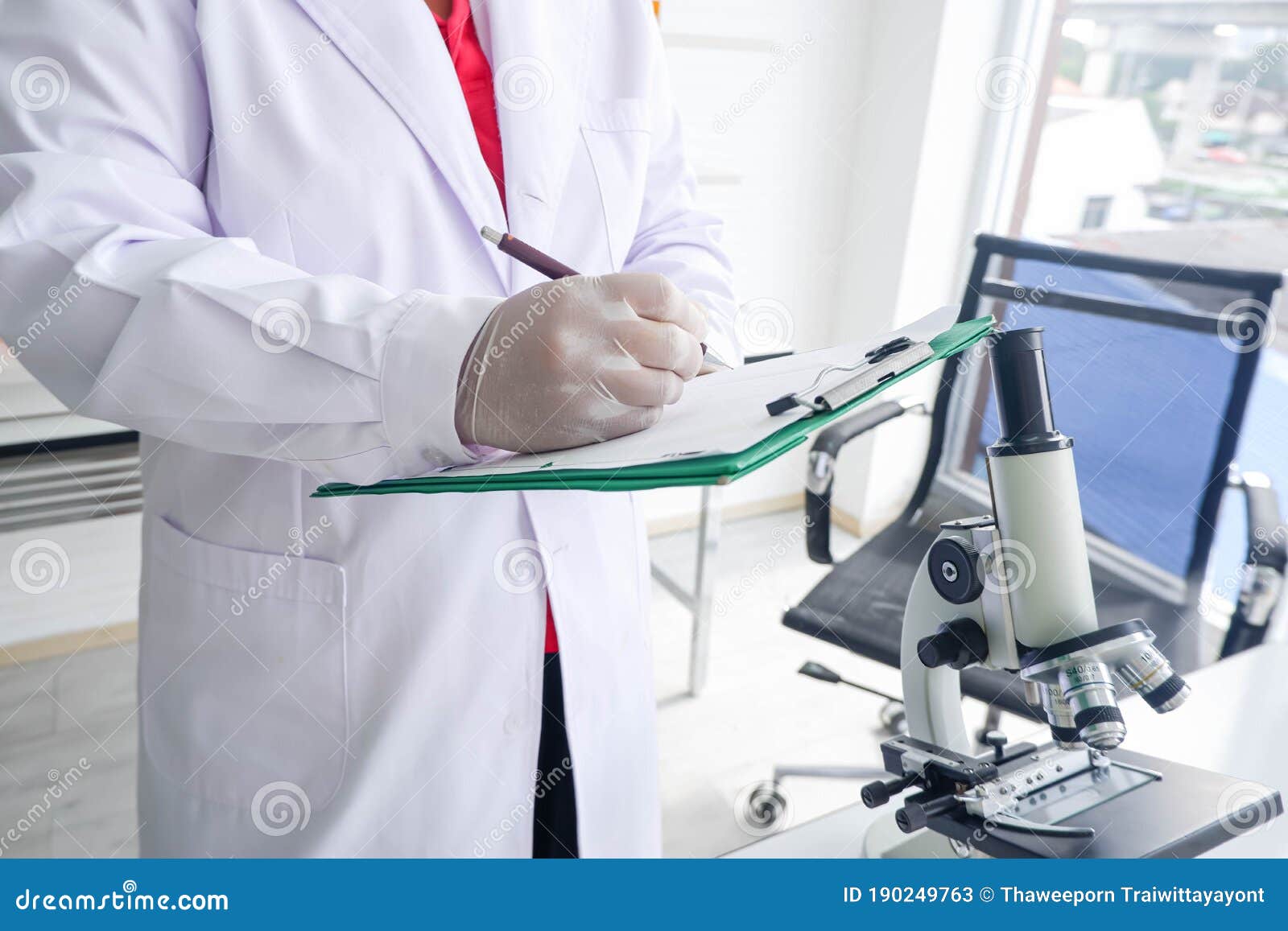 Hand of Scientist Taking Notes in Laboratory Stock Image - Image of ...