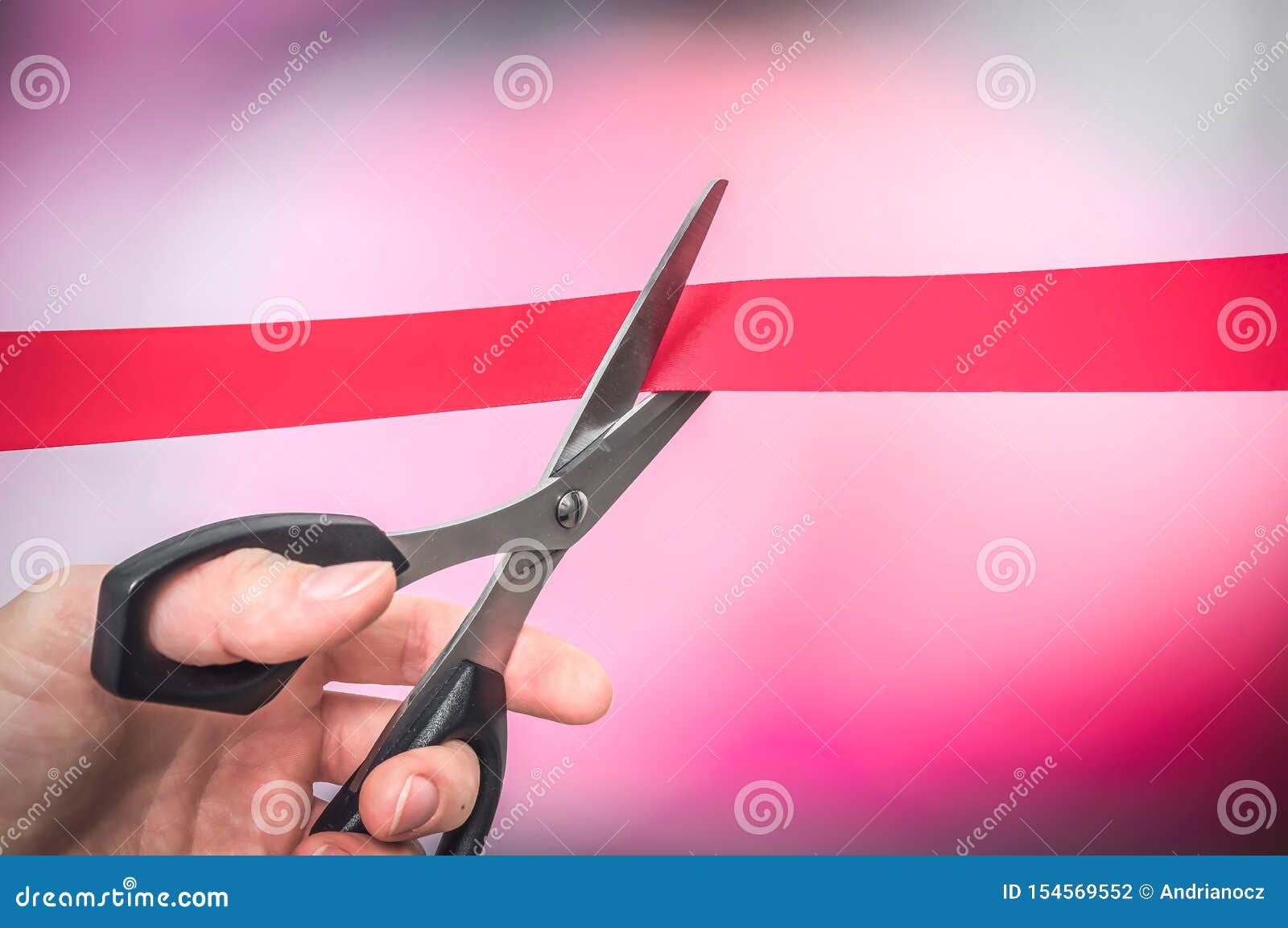 Hand with Scissors Cutting Red Ribbon - Opening Ceremony Stock Photo ...