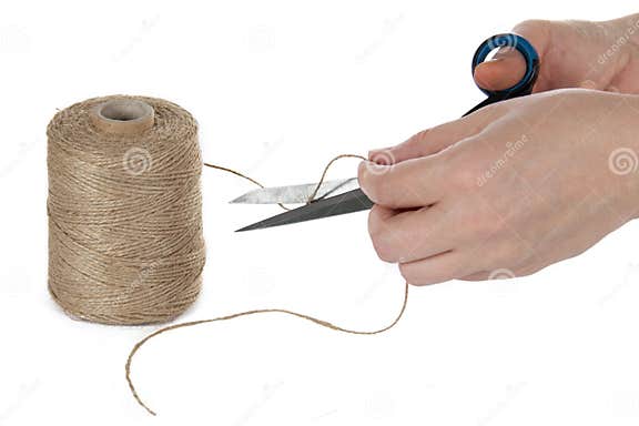The Hand with the Scissors Cutting a Rope Stock Photo - Image of ...