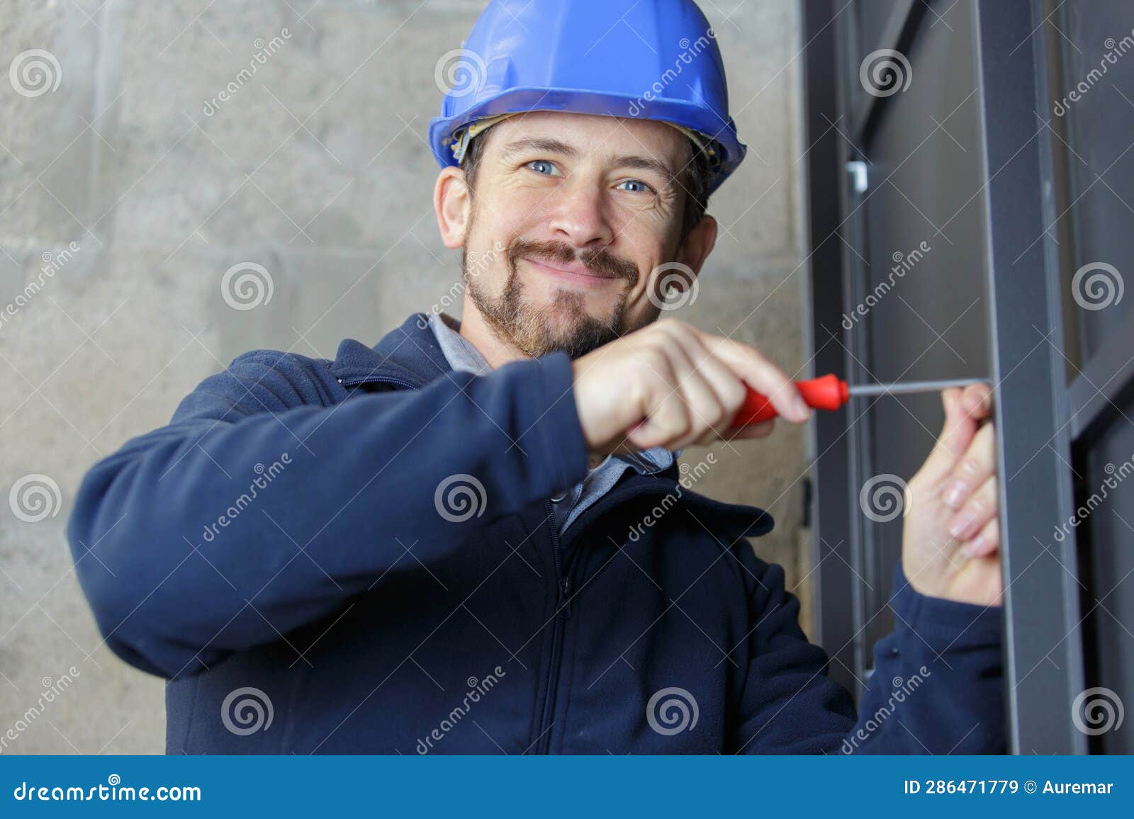 Hand Screwing into Electronic Device with Screwdriver Stock Image ...
