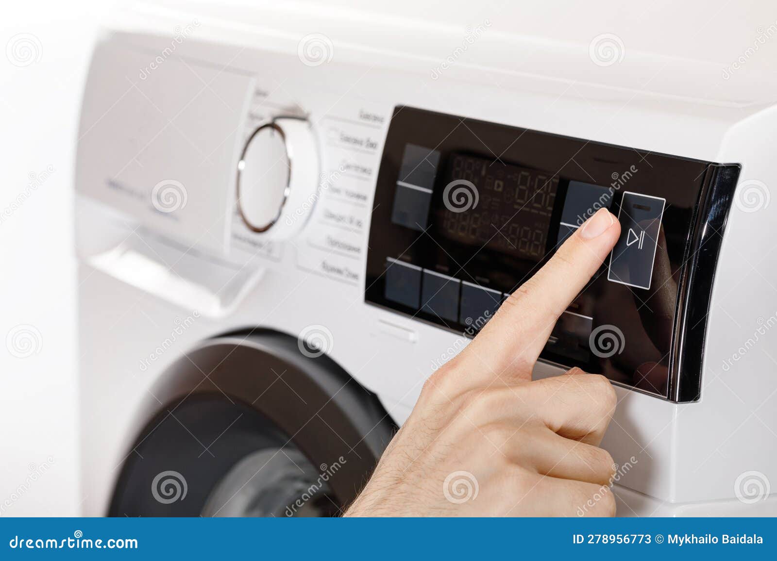 The Hand Select Settings for Laundry on Modern Digital Display. Close ...