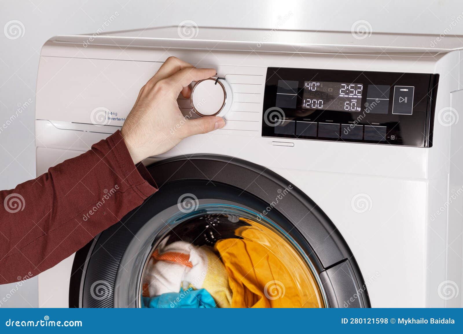 The Hand Select Settings for Laundry on Modern Digital Display. Close ...