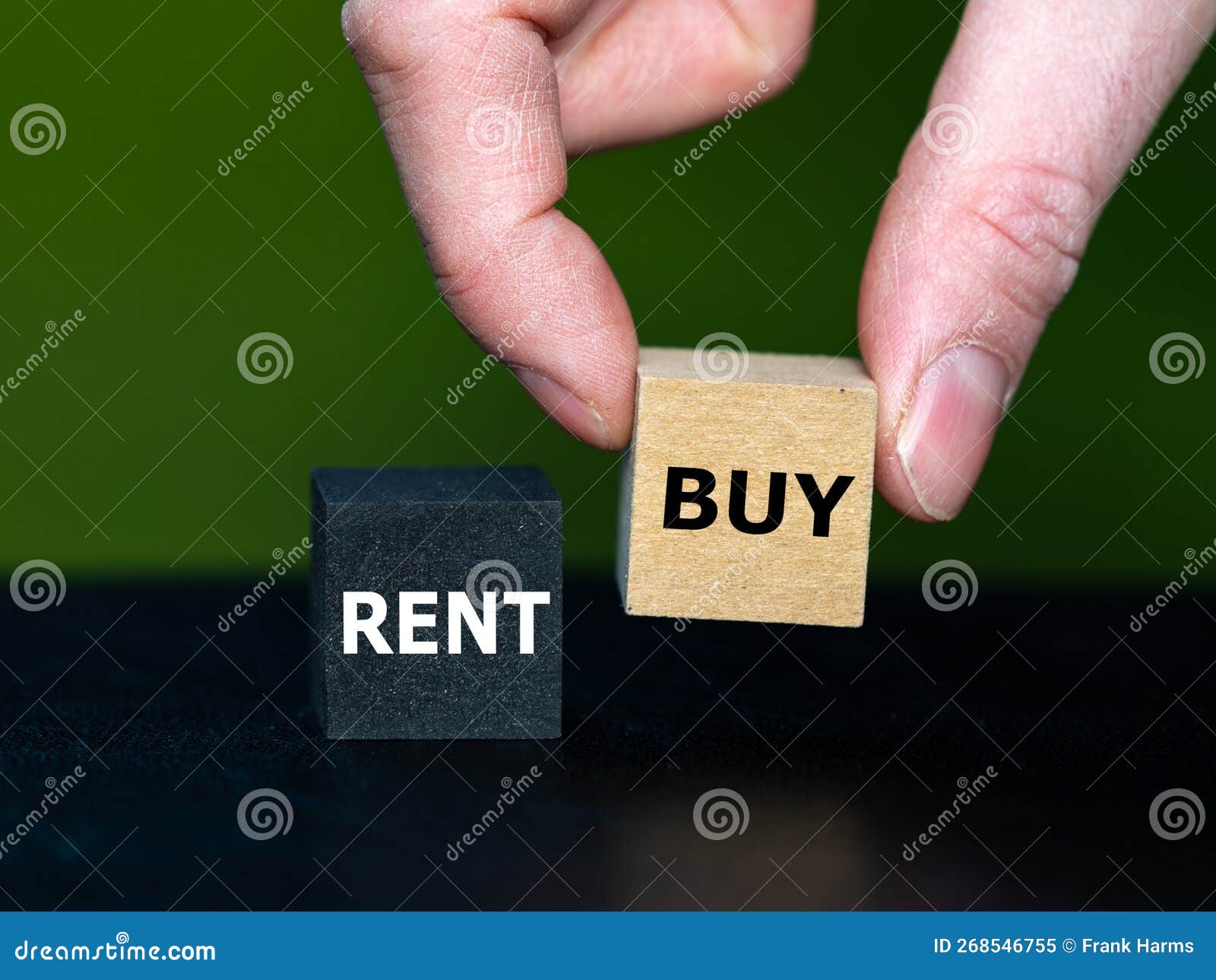 Hand Selects the Cube with the Word Buy instead of the Cube with the ...