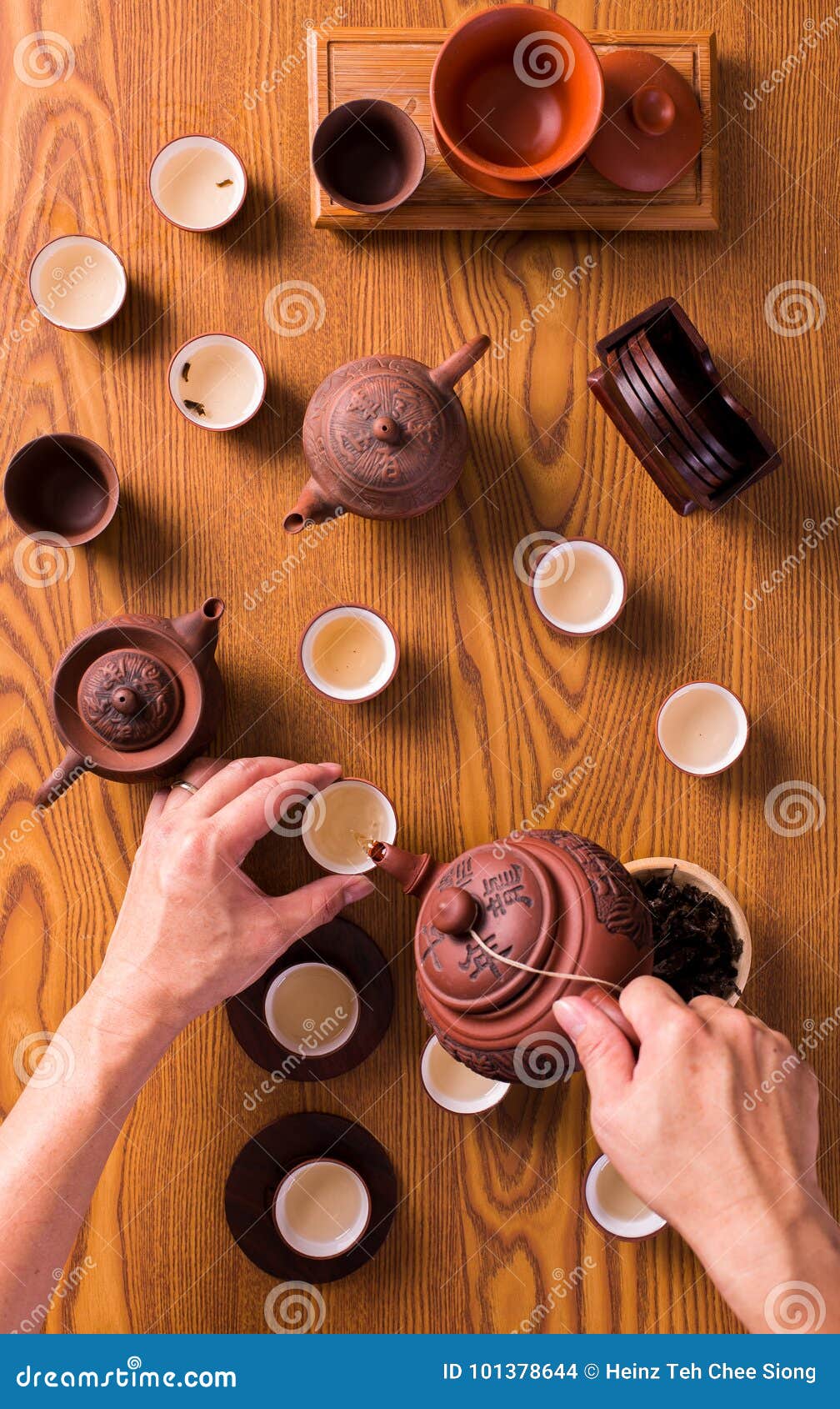 Hand serving a chinese tea stock photo. Image of teacup - 101378644