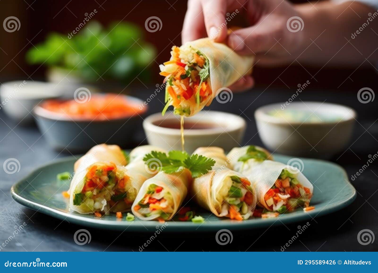 Hand Serving Spring Roll with a Side of Sweet Chilli Dip Stock Photo ...