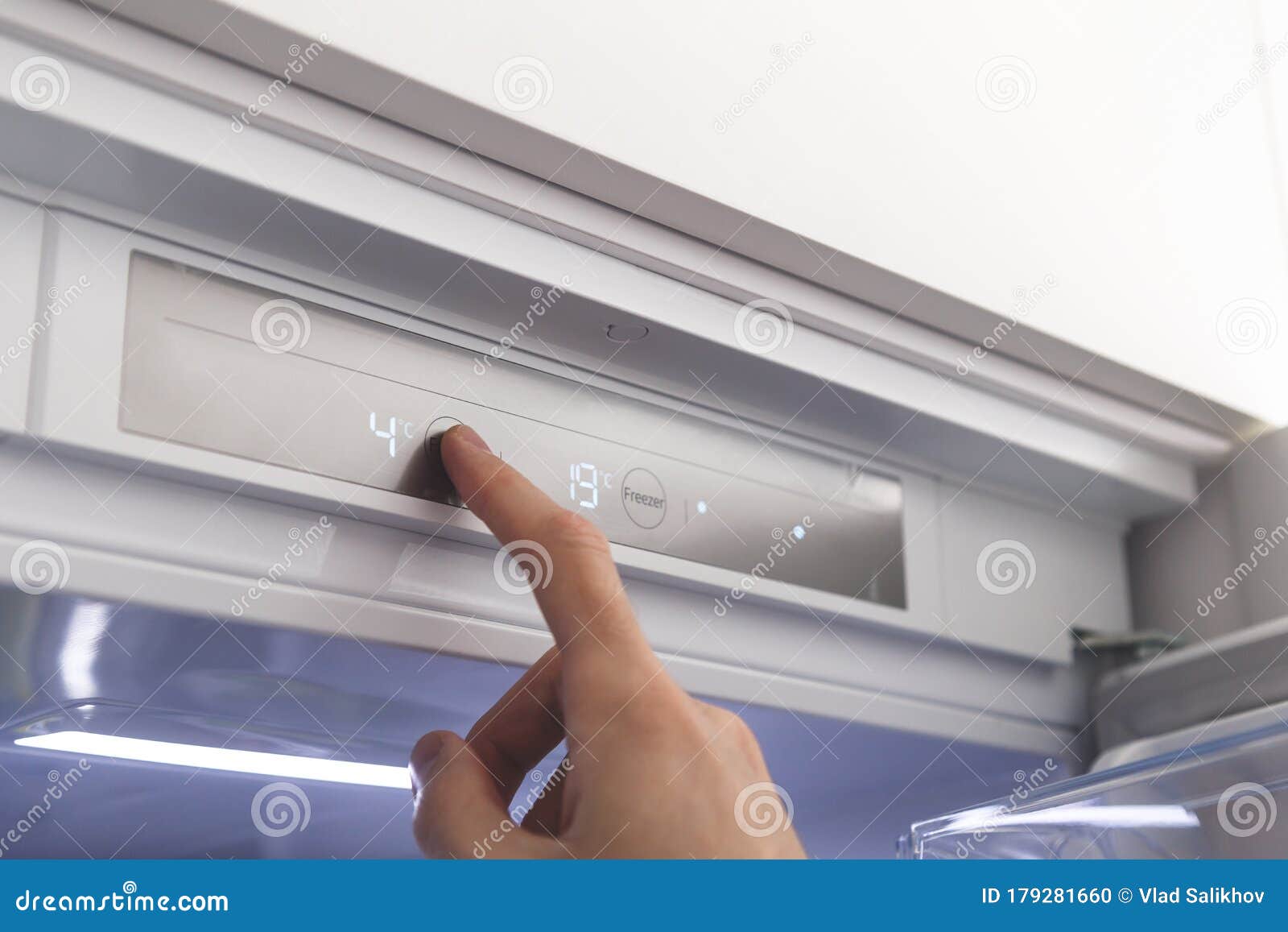 Hand Sets Temperature of Refrigerator Stock Photo - Image of fingers ...