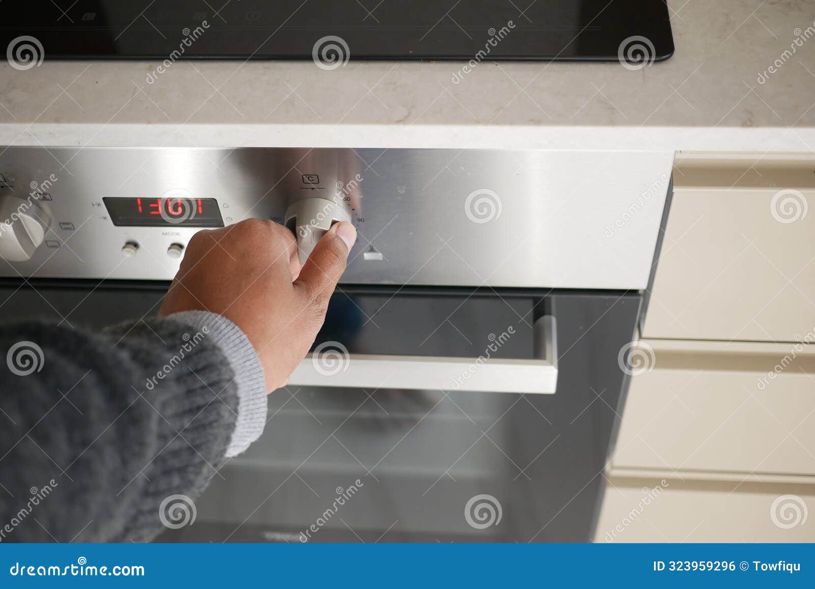 Hand Setting Temperature Control on Oven. Stock Photo - Image of ...