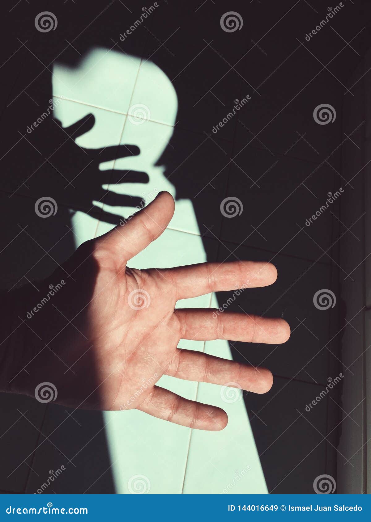 Hand in the shadows stock image. Image of body, minimal - 144016649