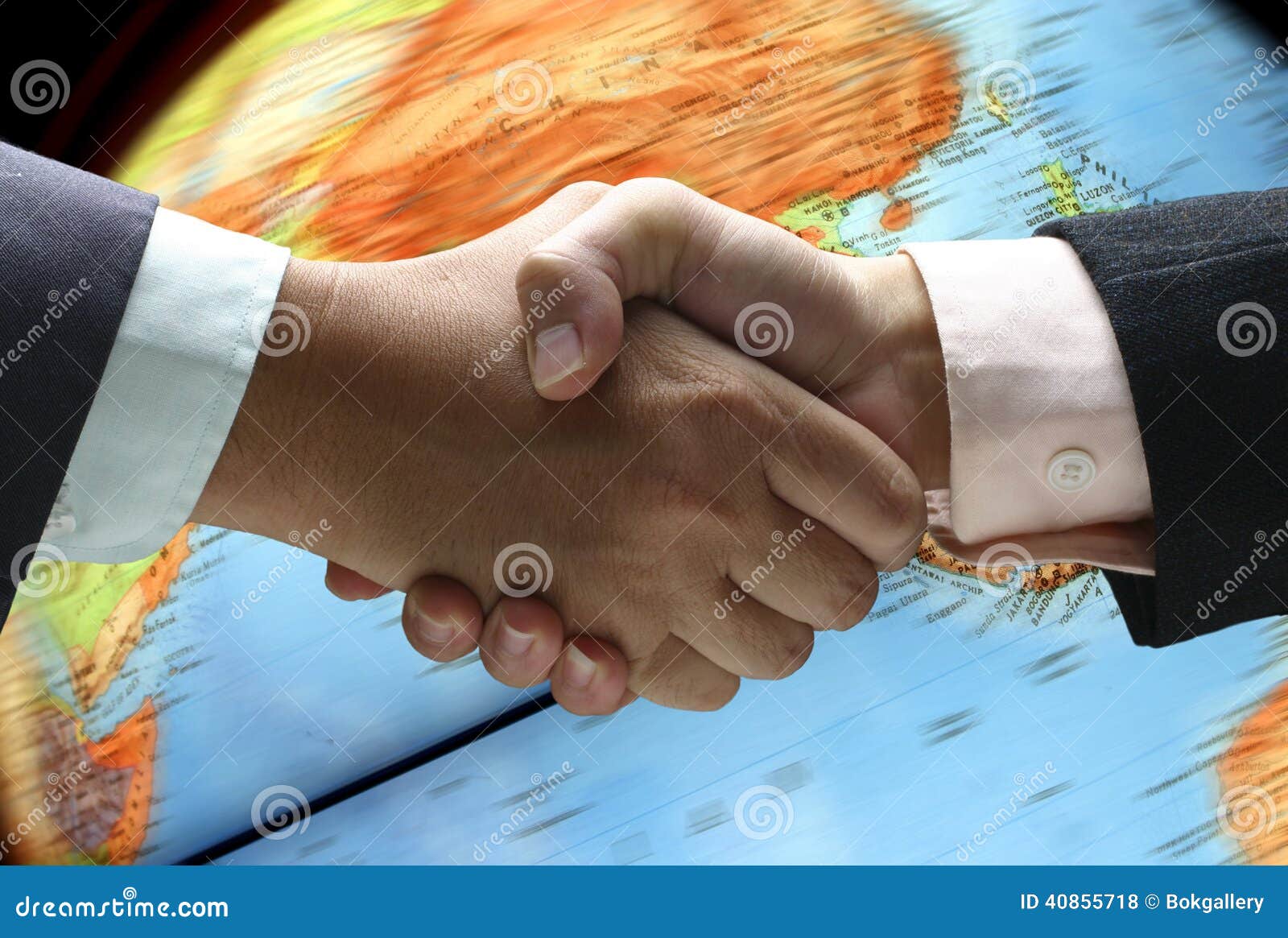 Hand shake over globe stock photo. Image of trade, globe - 40855718