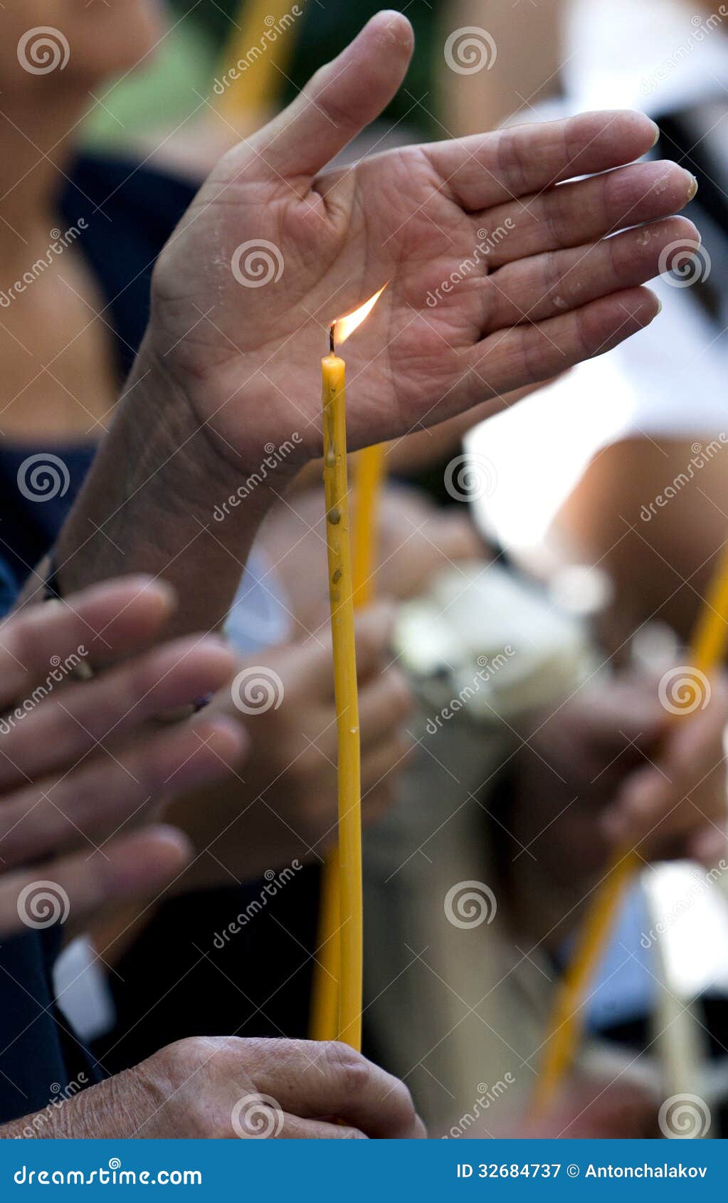 Hand shields candle stock image. Image of orthodox, hand - 32684737