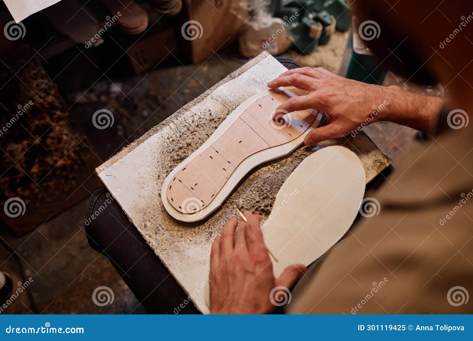 Hand of Shoemaking Master Putting Shape Sample on Boot Sole Workpiece ...