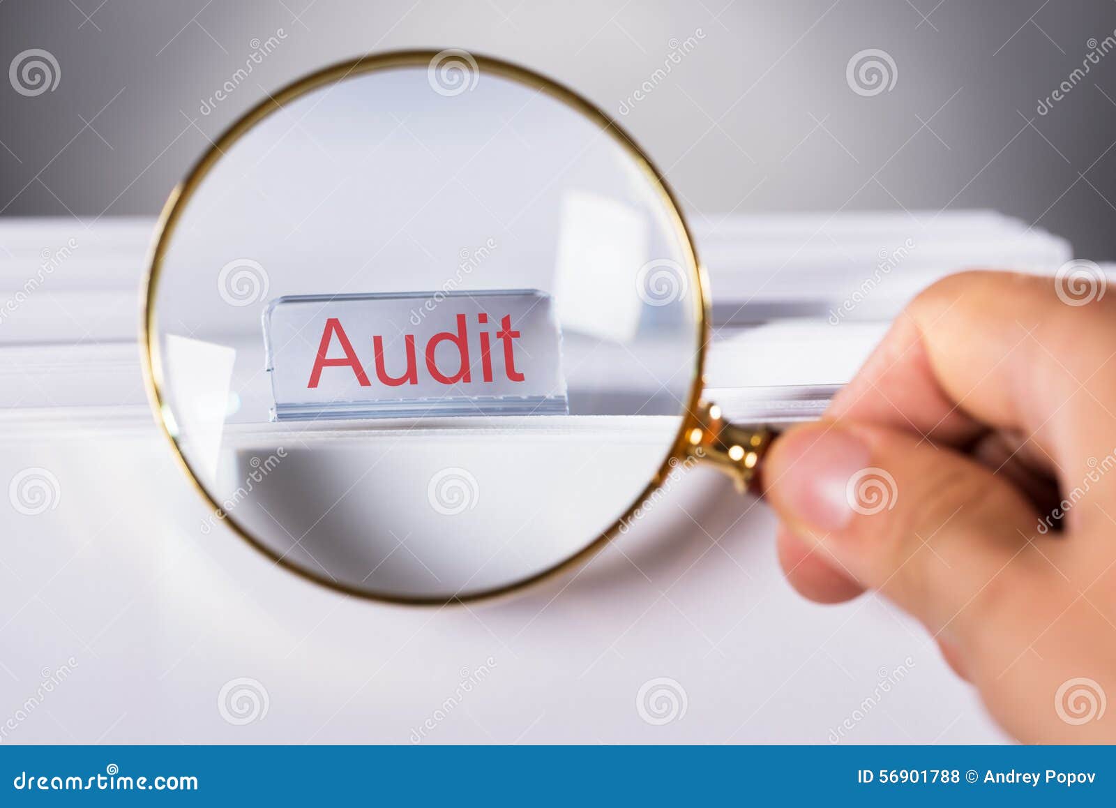Hand Showing Audit Tab through Magnifying Glass Stock Photo - Image of ...