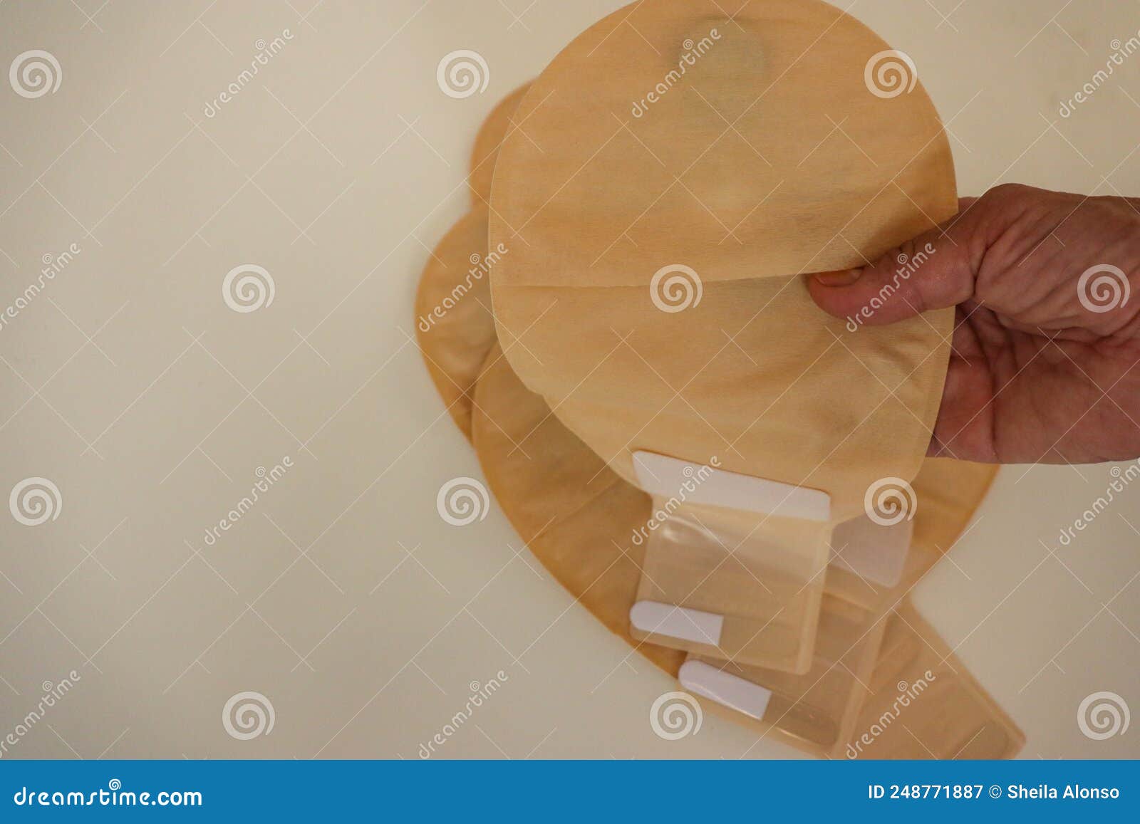 A Hand Showing an Colostomy Bag Stock Image - Image of human, device ...