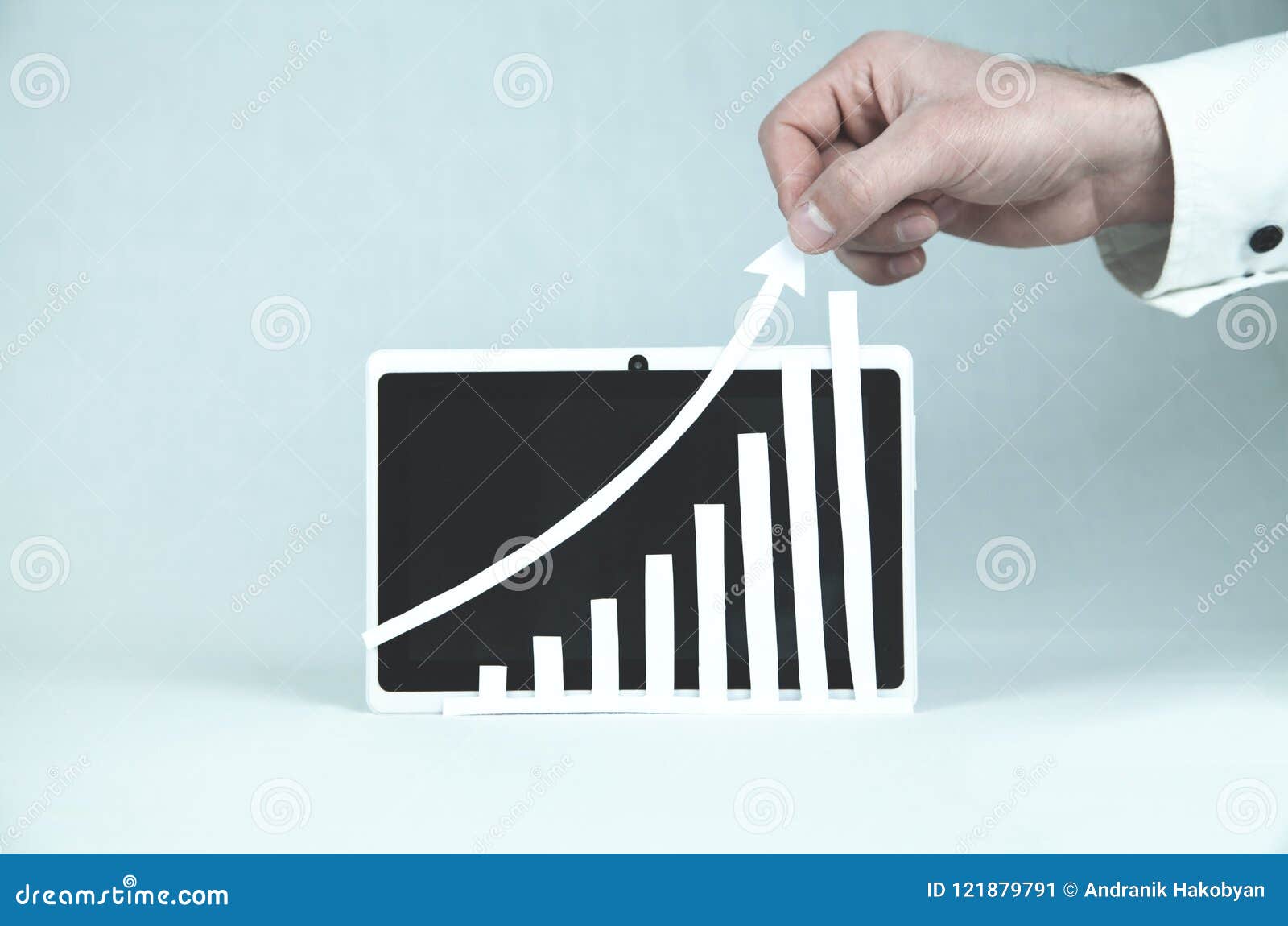Hand Showing Paper Growth Graph Over White Tablet. Stock Image - Image ...