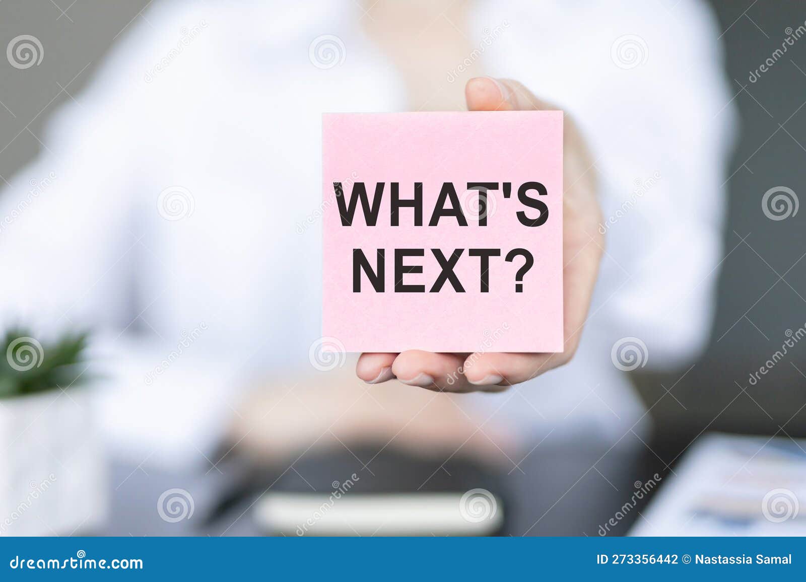 Hand Showing the Text WHATS NEXT, Text on Paper Sticker Stock Photo ...