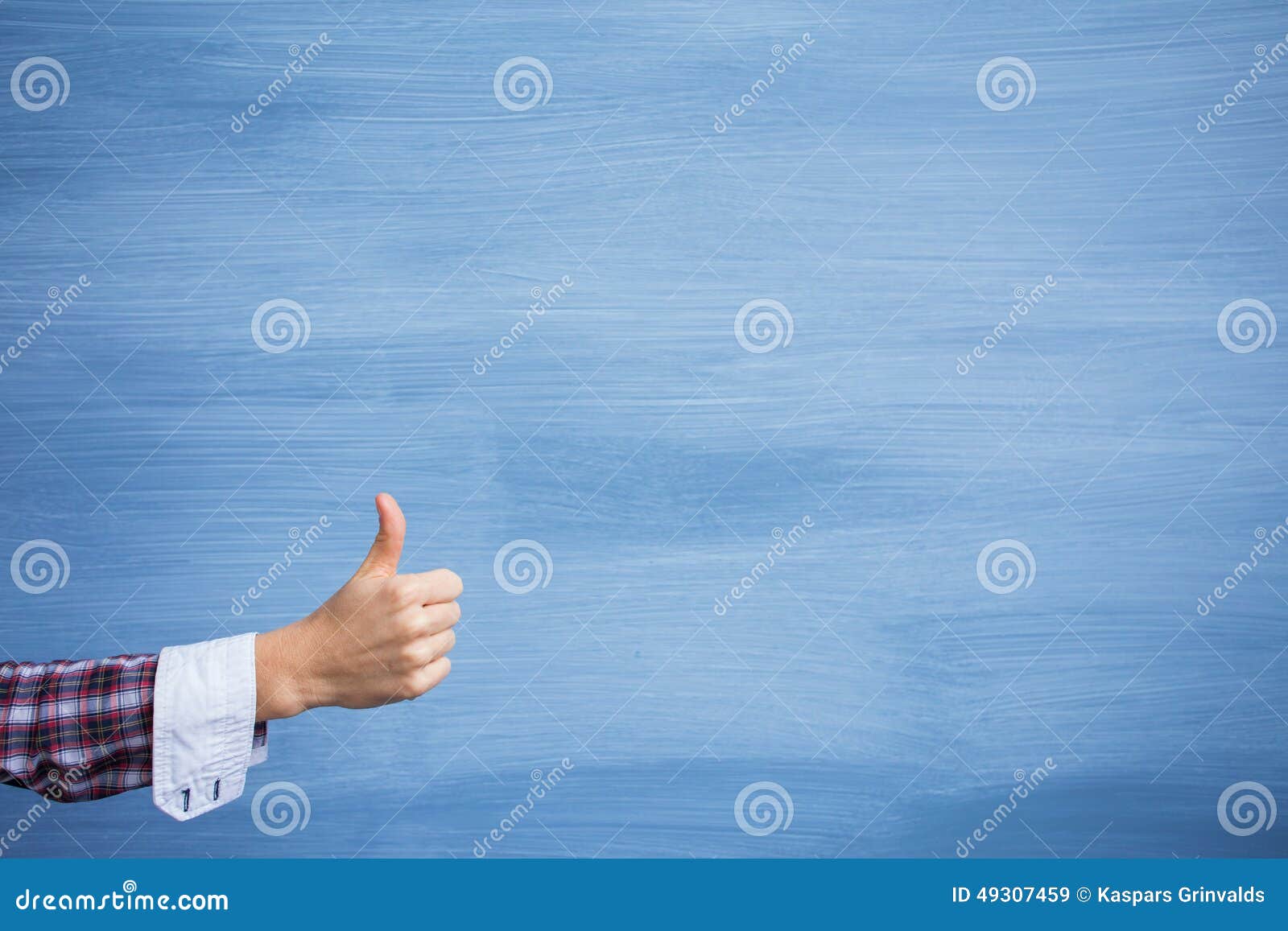 Hand Showing Thumbs Up Gesture on Blue Background Stock Image - Image ...
