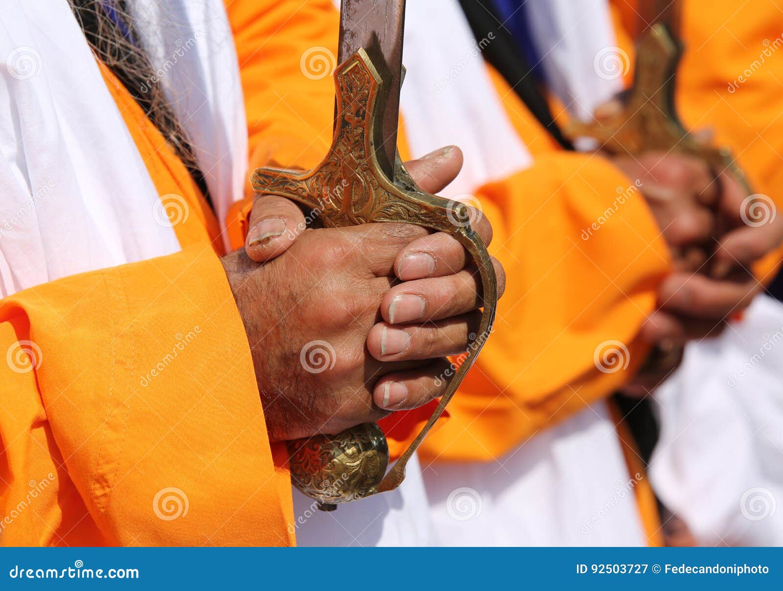 Hand of a Sikh Man on the Hilt of the Sword during the Parade Stock ...