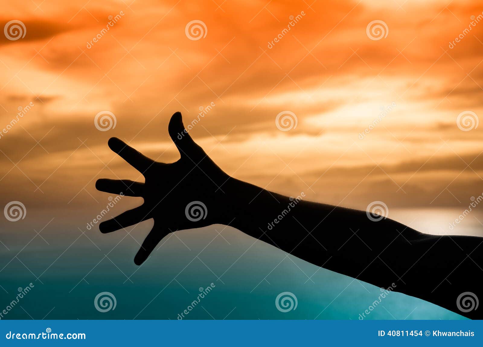 Hand Silhouette Under Sunset Stock Photo - Image of freedom, orange ...