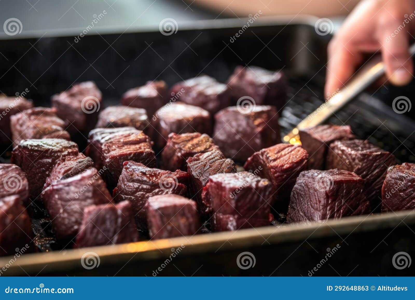 Hand Skewering Stout-marinated Beef Brisket Cubes for Grilling Stock ...