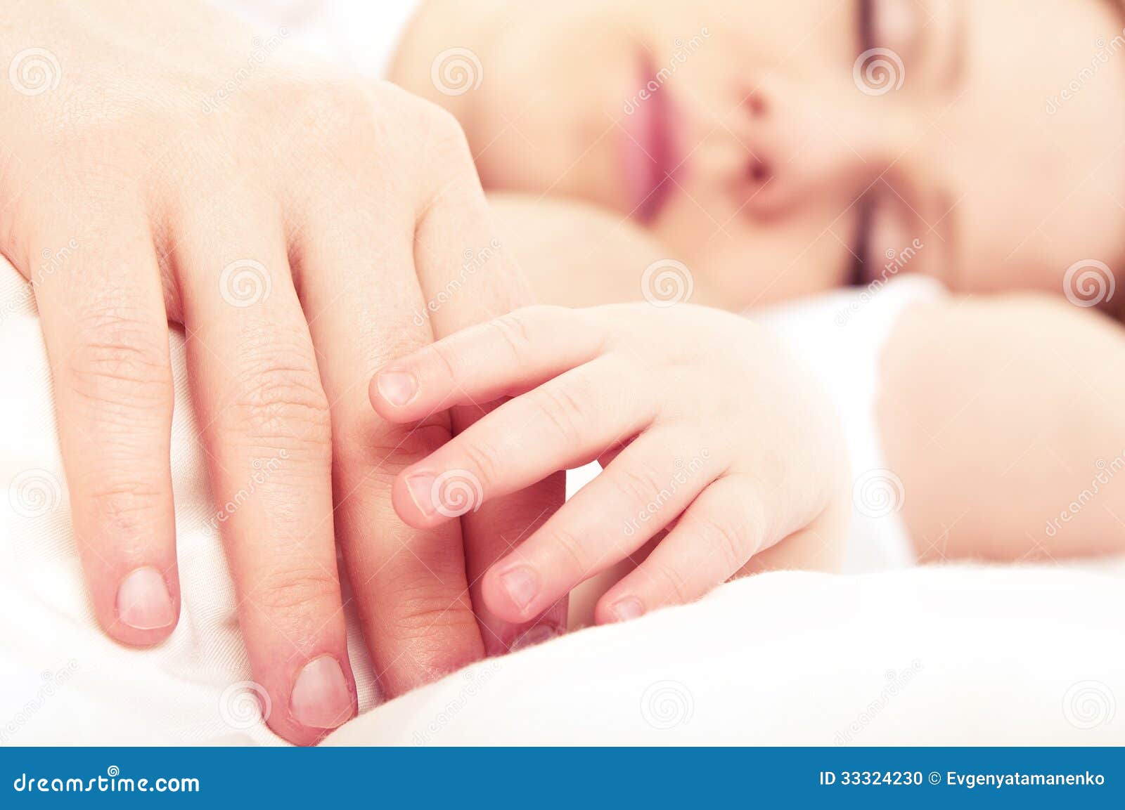 Hand the Sleeping Baby in the Hand of Mother Stock Photo - Image of ...