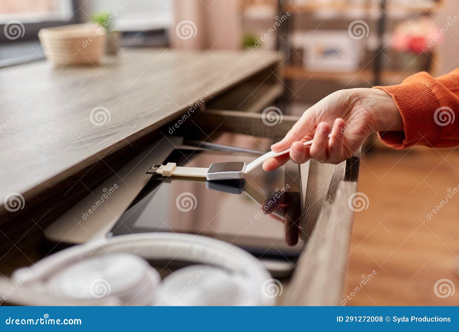 Hand with Smart Watch and Gadgets in Desk Drawer Stock Photo - Image of ...