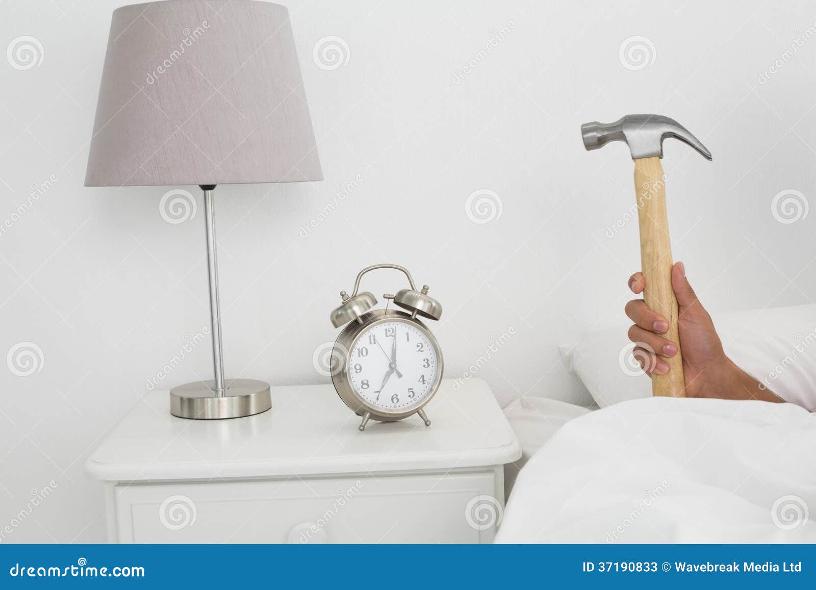 Hand Smashing Alarm Clock with Hammer in Bed Stock Image - Image of ...