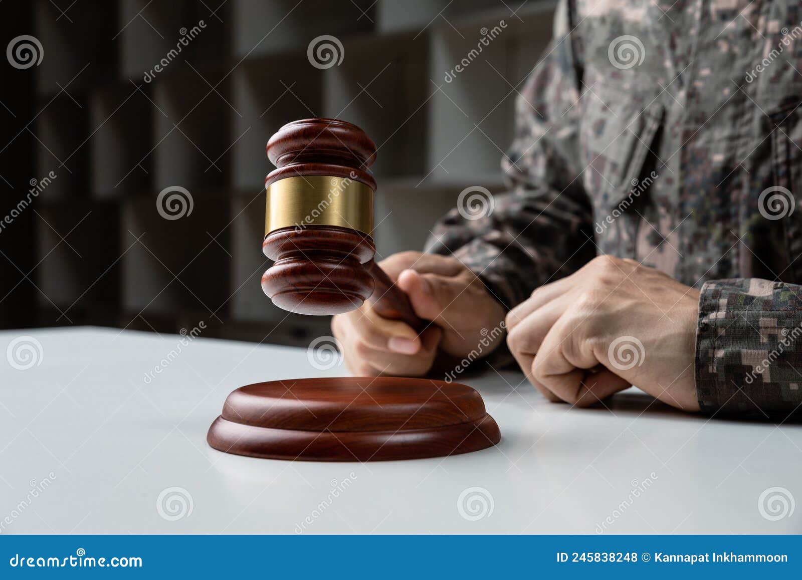Hand of Soldier Holding Gavel Stock Photo - Image of hand, regulation ...