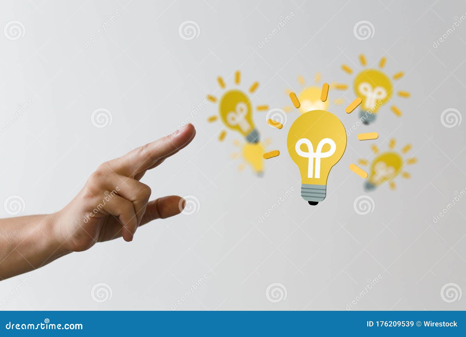 Hand and Some Light Bulbs Depicting Innovative Ideas and Creative ...