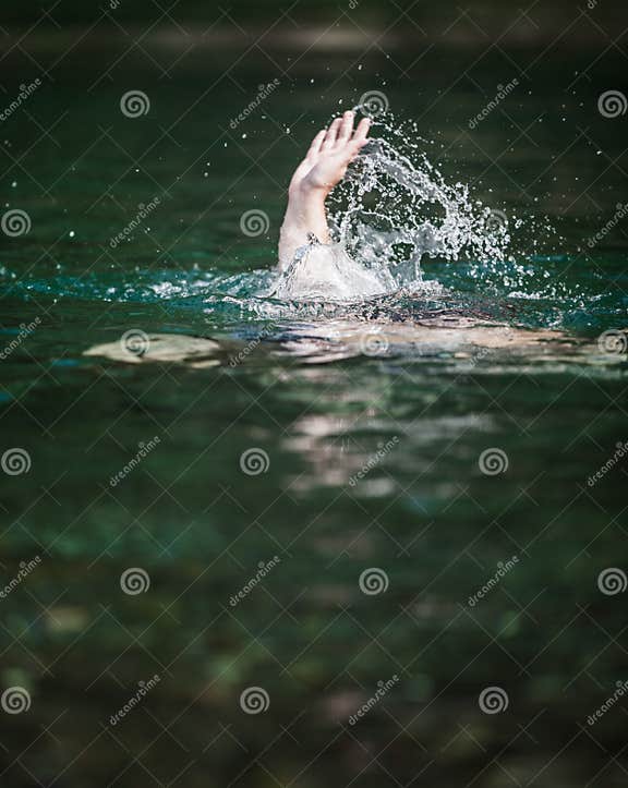 Hand of Someone Drowning and in Need of Help Stock Photo - Image of ...