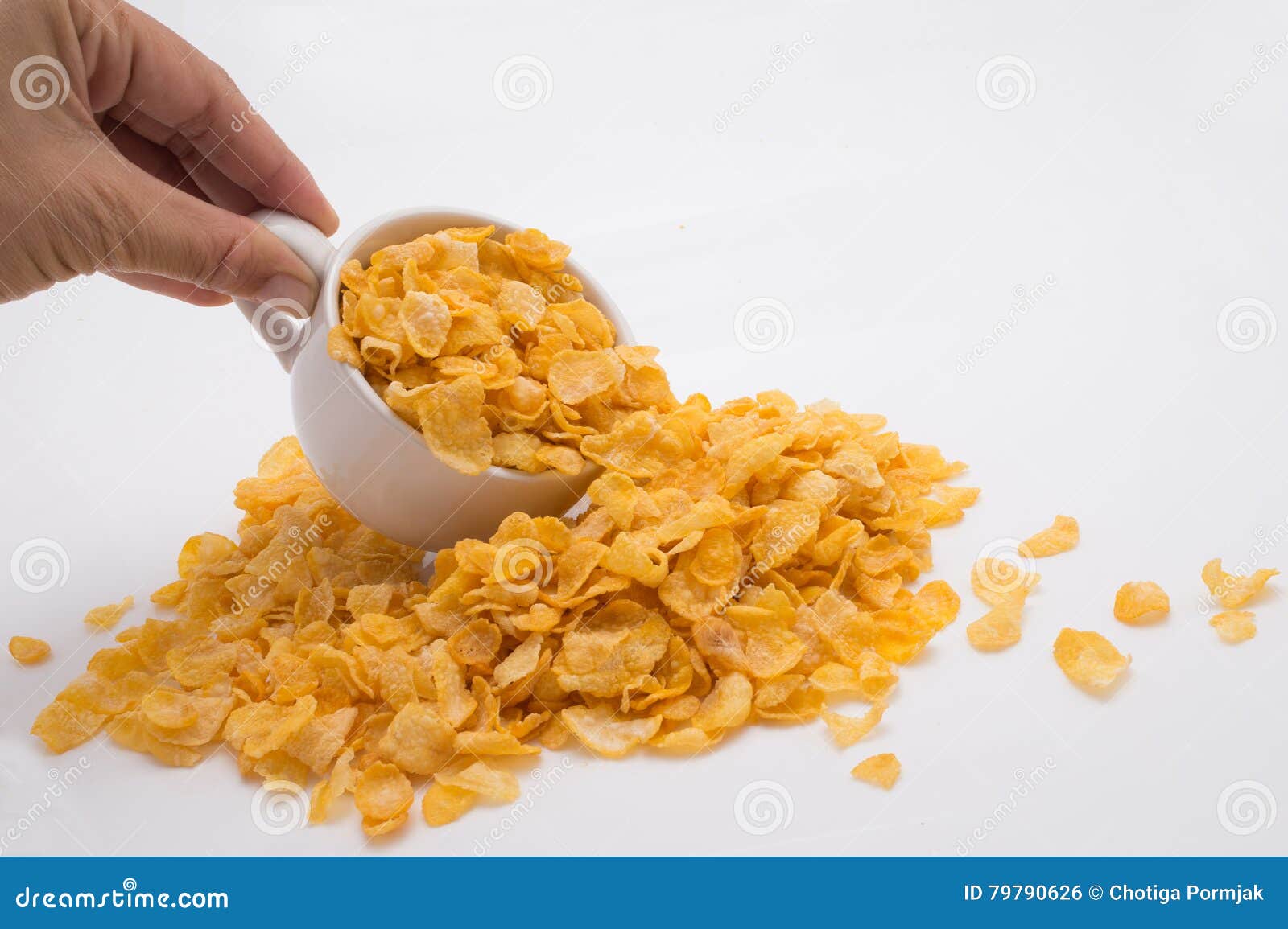 Hand Spilling Corn Flakes Out of Tiny Cup Stock Photo - Image of fresh ...