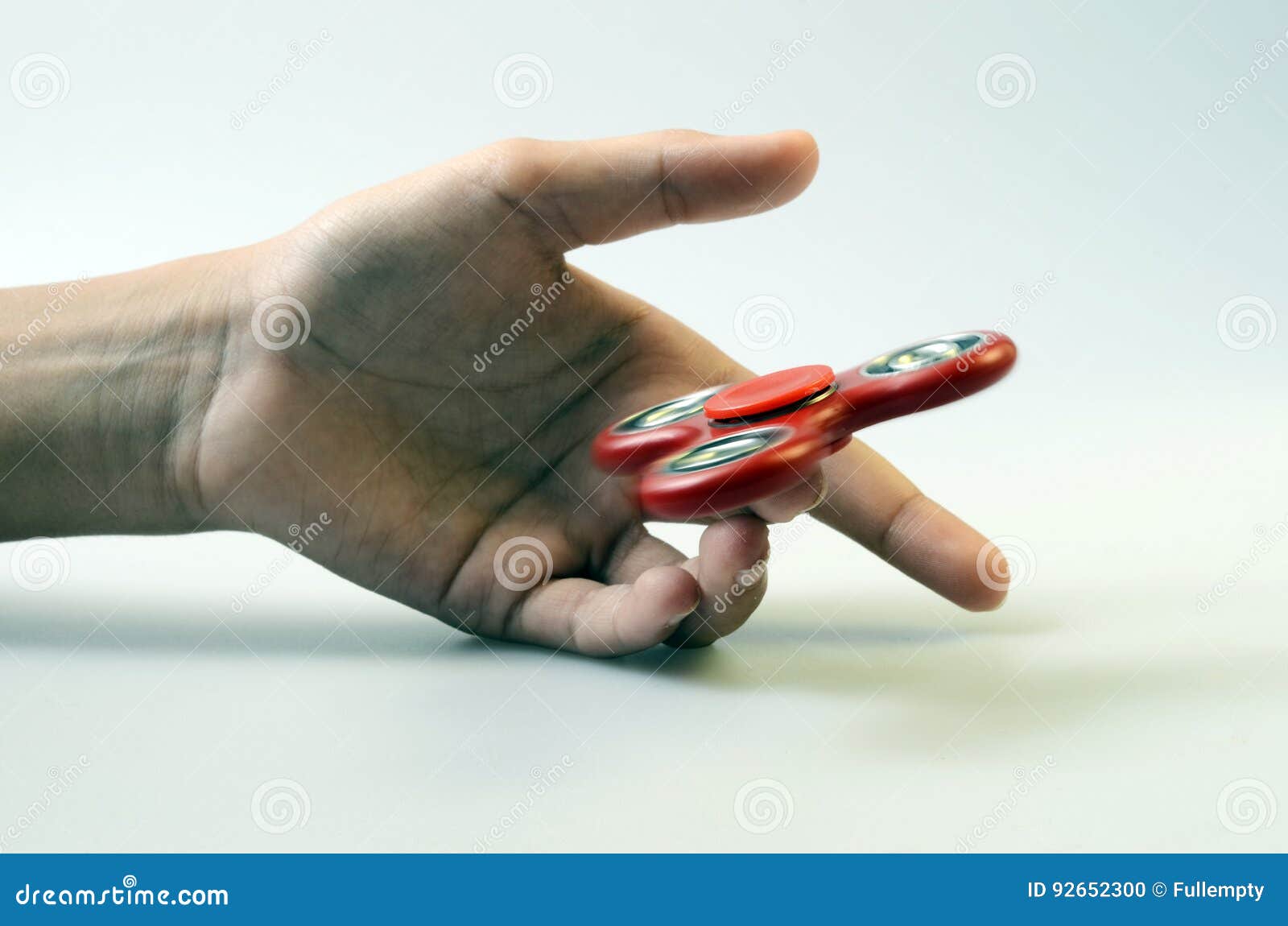 Hand Spinner, Fidgeting Hand Toy Stock Photo - Image of nail, fidget ... Hand Spinner, Fidgeting Hand Toy Stock Photo - Image of nail, fidget ...
