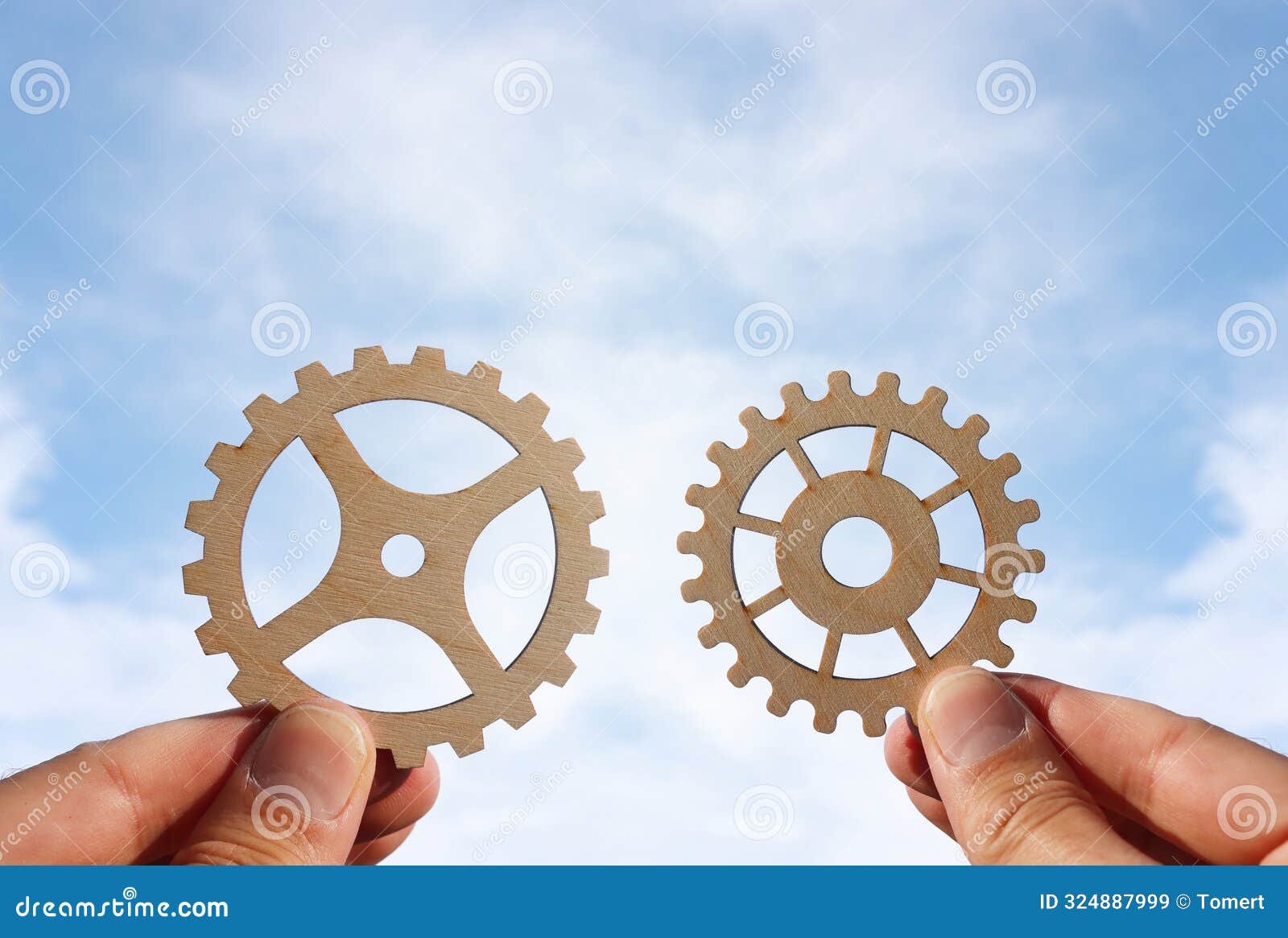 Hand Spinning Gears in Front of Sky Stock Image - Image of banner ...