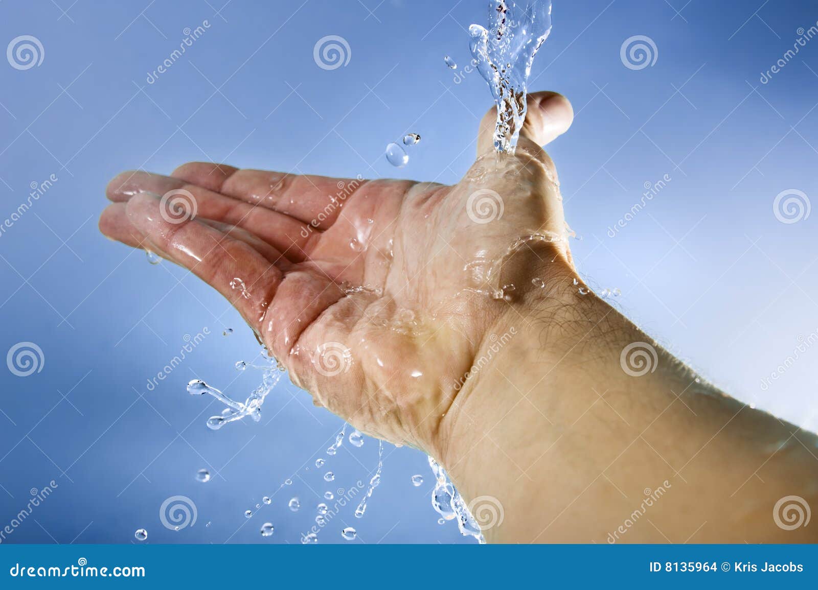 Hand Splashing Water on Blue Background Stock Photo - Image of ...