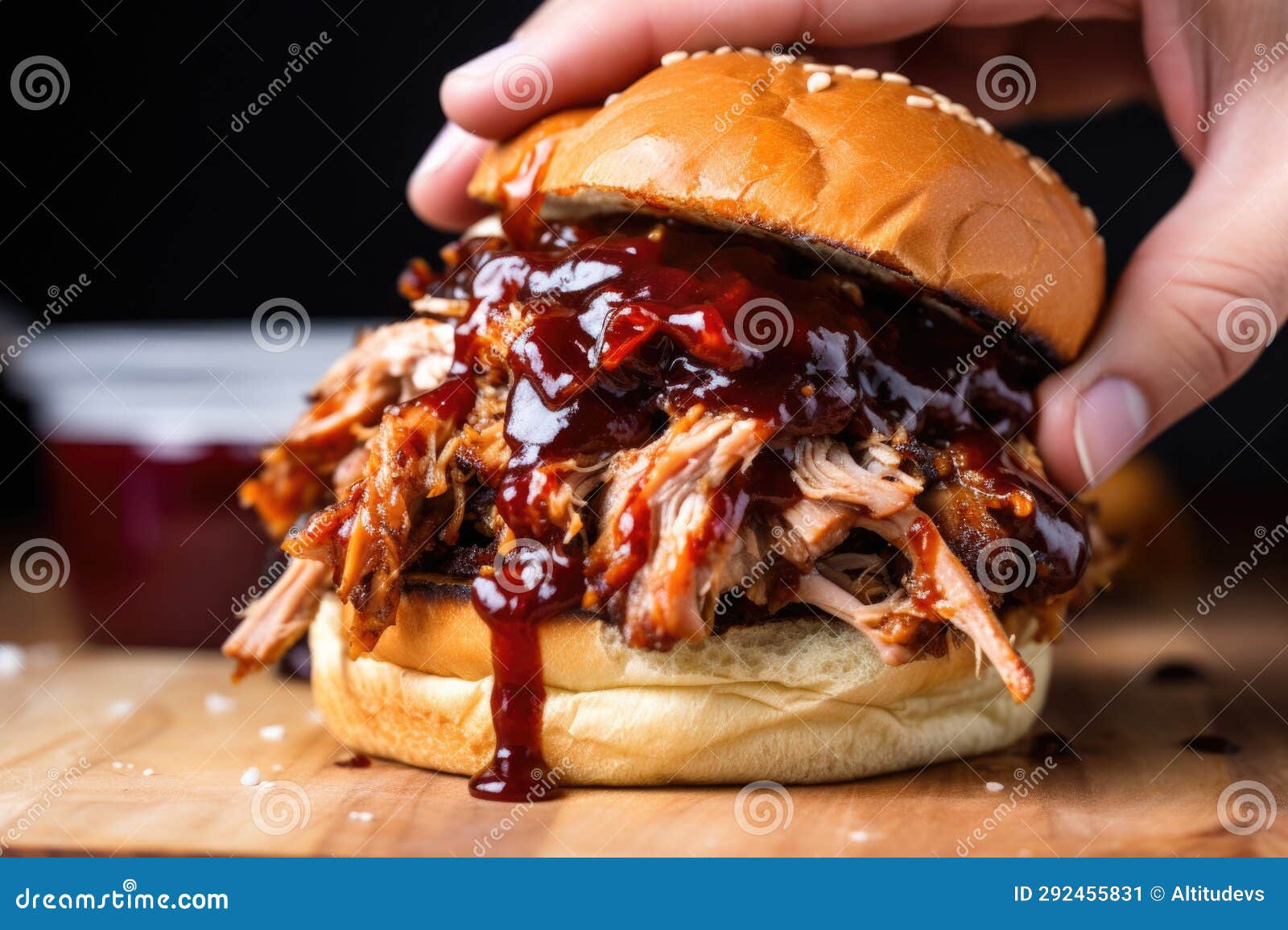 Hand Spooning Bbq Pulled Pork into a Bun Stock Illustration ...