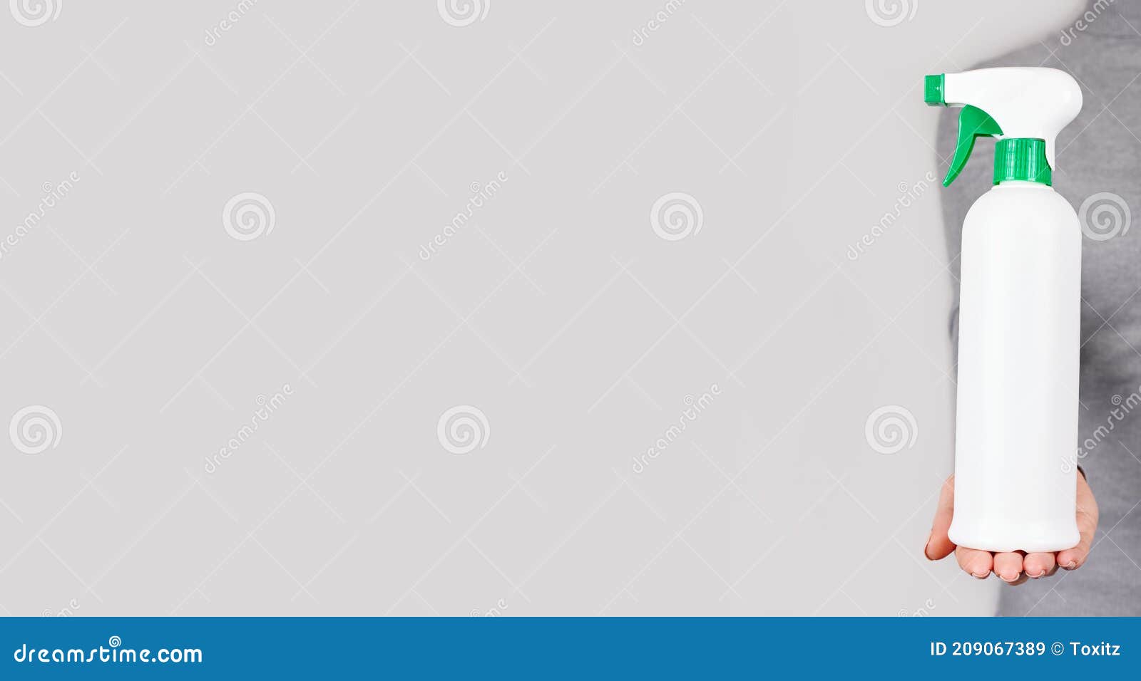 Hand with Spray Bottle on Grey Background Stock Image - Image of ...