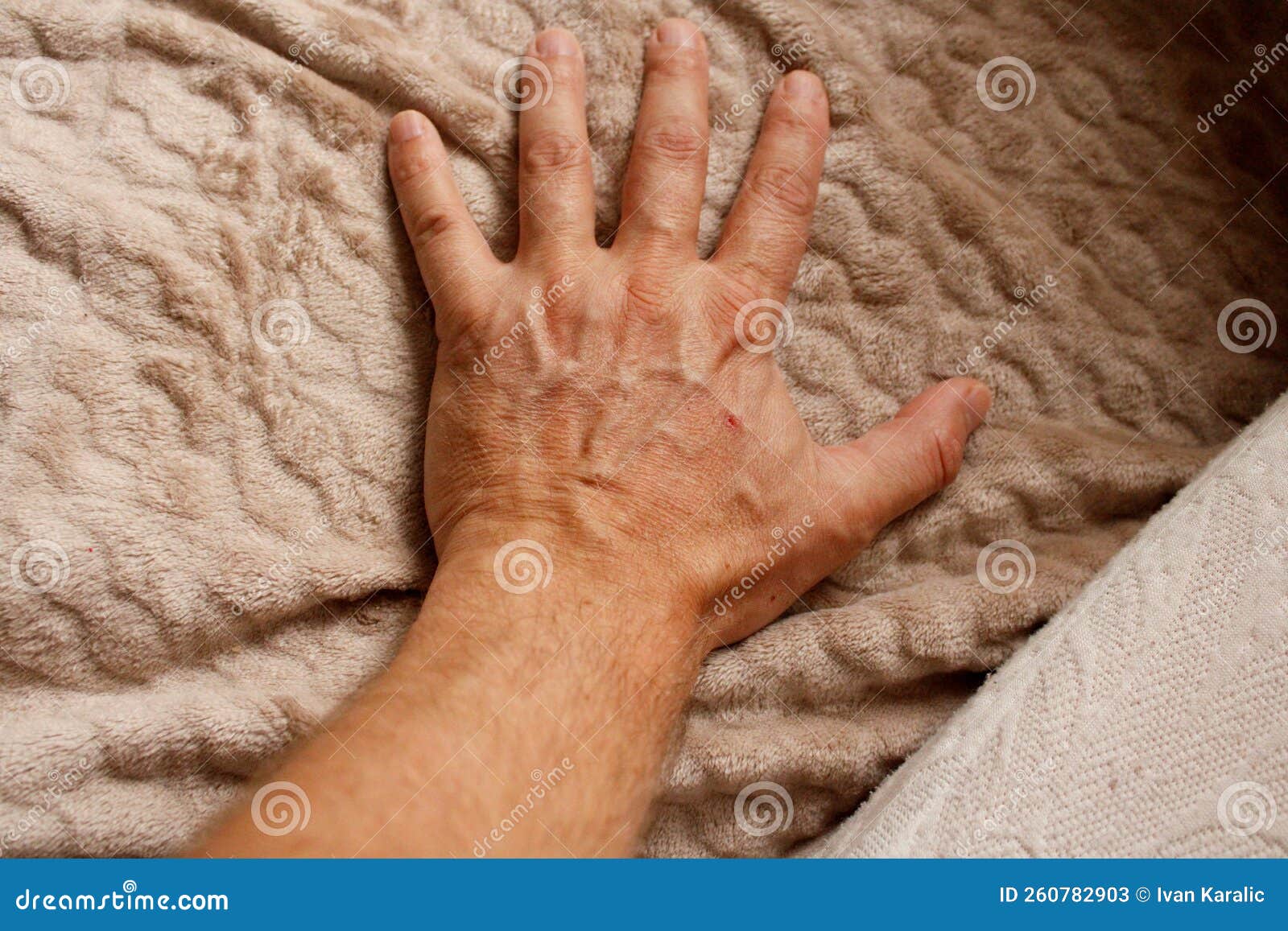 A Hand with Spread Fingers on a Blanket Stock Image - Image of footwear ...
